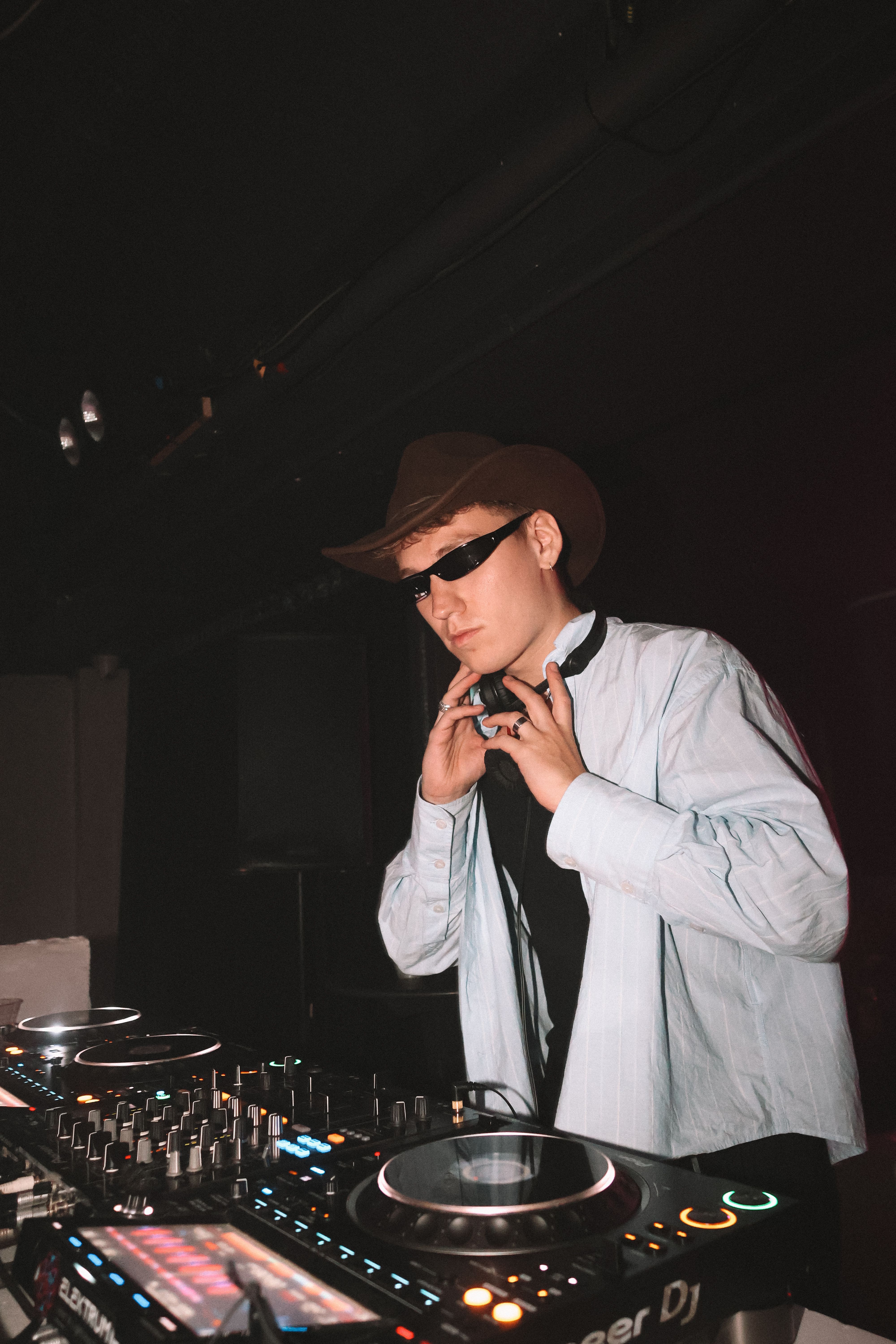 DJ Performing at Night in a Club · Free Stock Photo