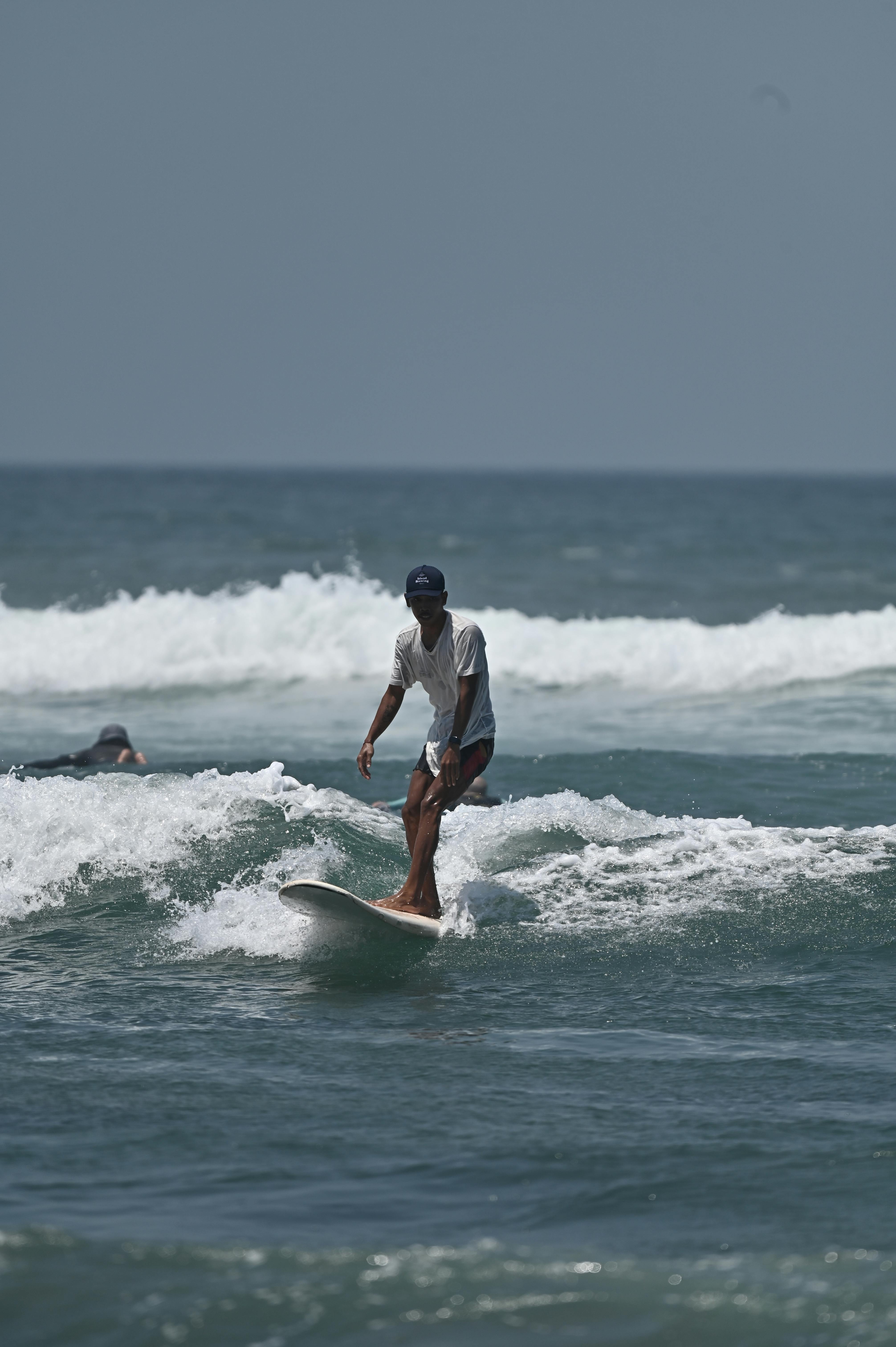 Exciting Surfing Adventure in Bali Waves · Free Stock Photo