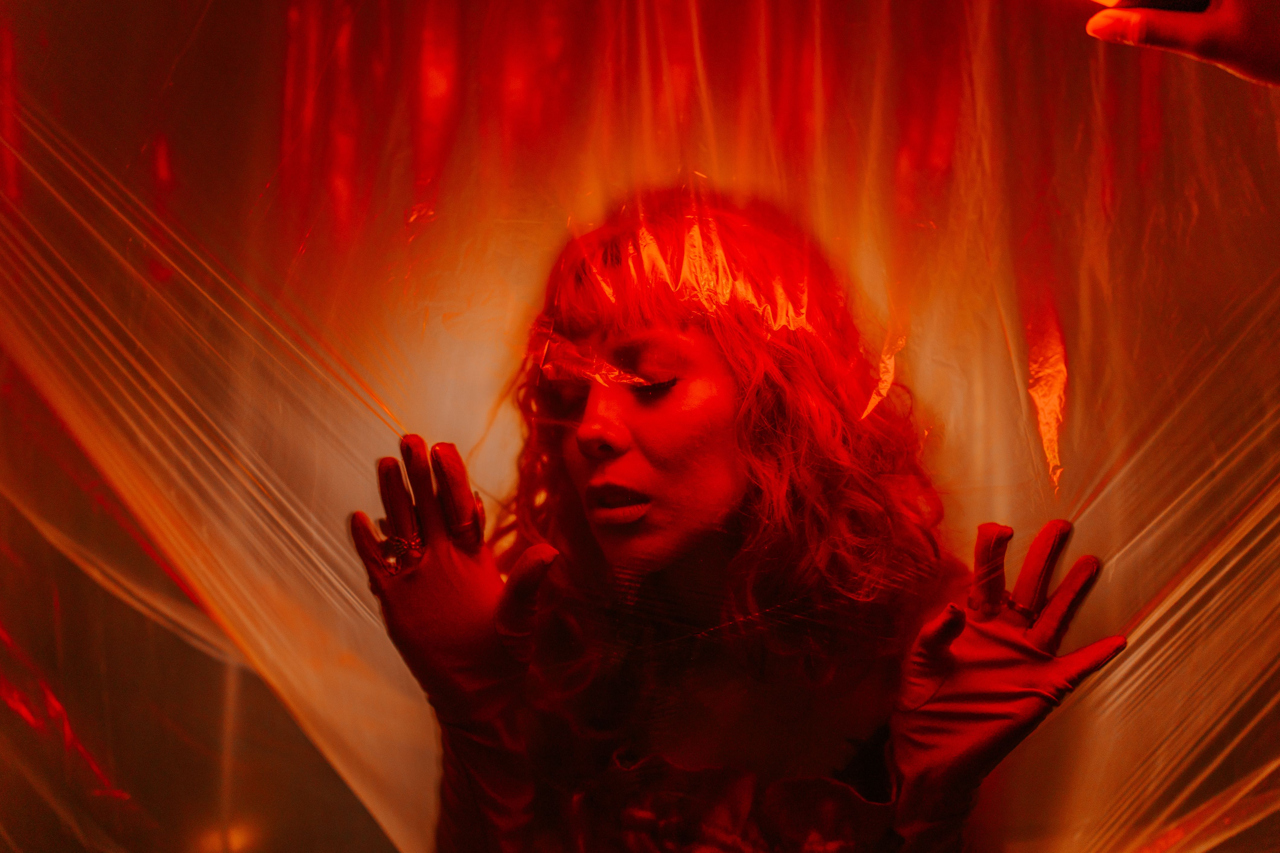 Dramatic Portrait in Fiery Red Light · Free Stock Photo