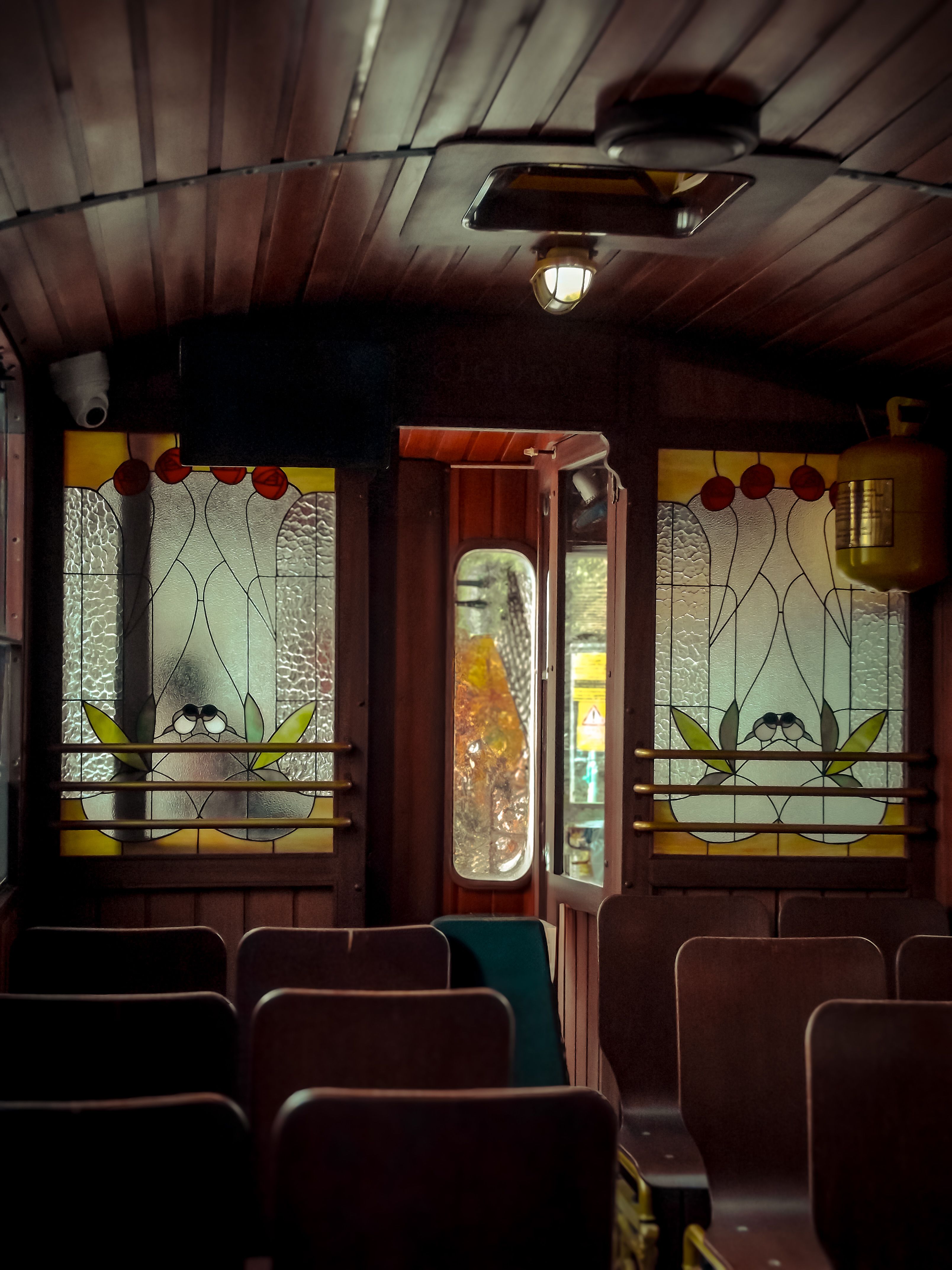 Vintage Train Cabin with Stained Glass Windows · Free Stock Photo