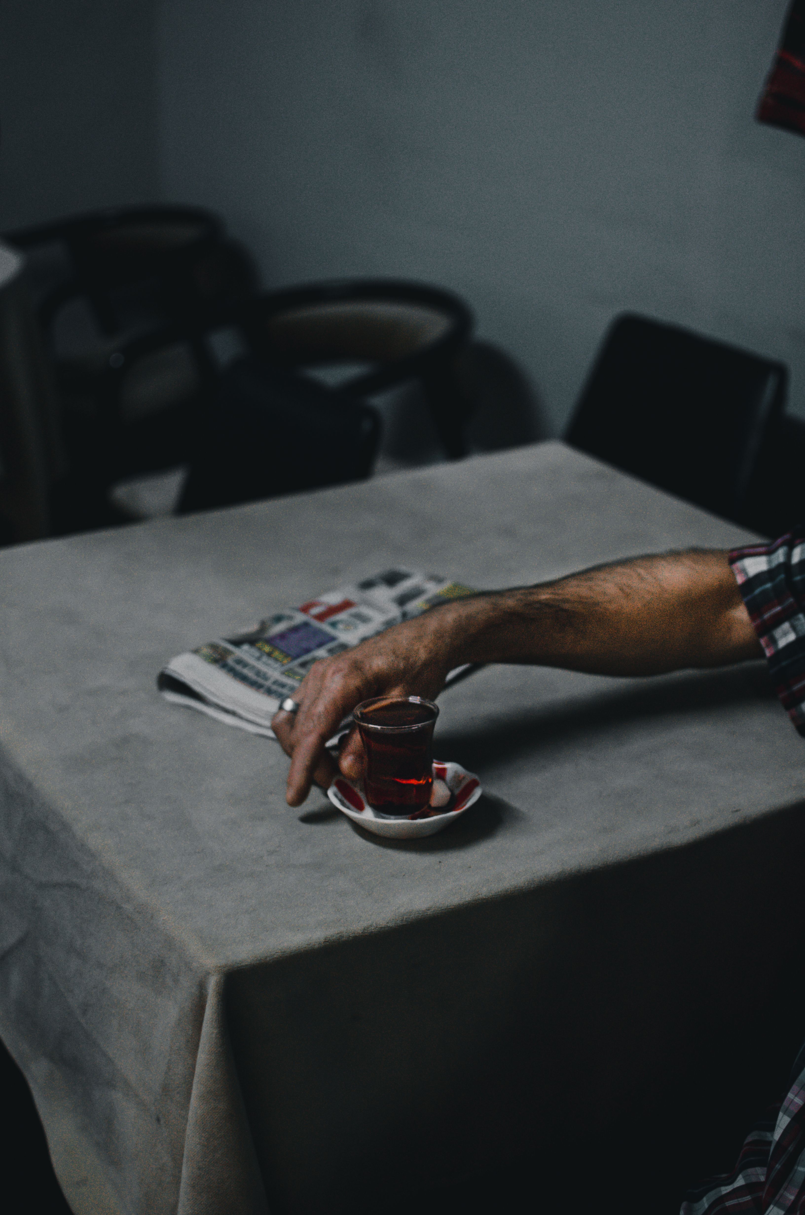 Person's Hand on Table · Free Stock Photo