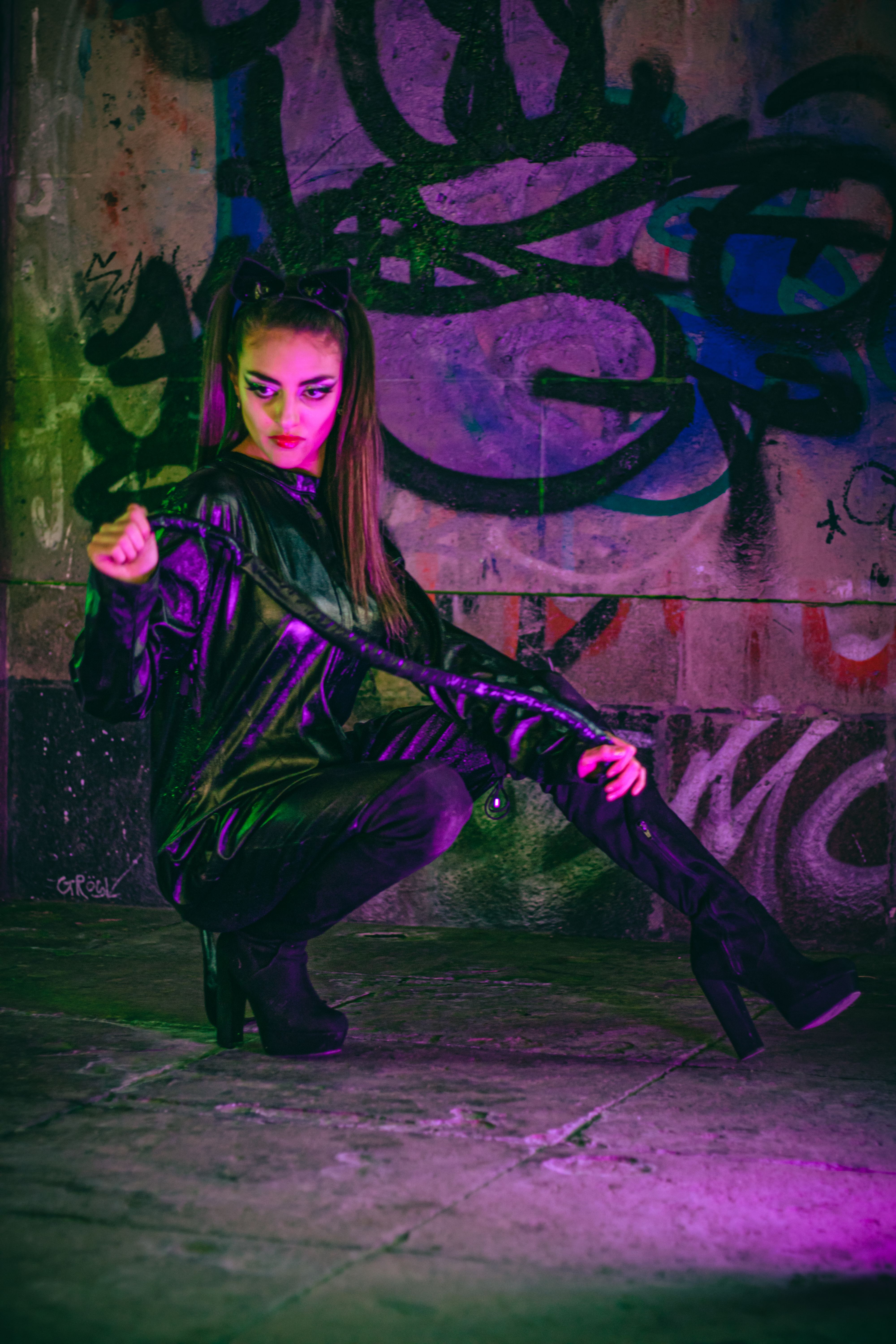 Vibrant Cosplay with Neon Graffiti Backdrop · Free Stock Photo