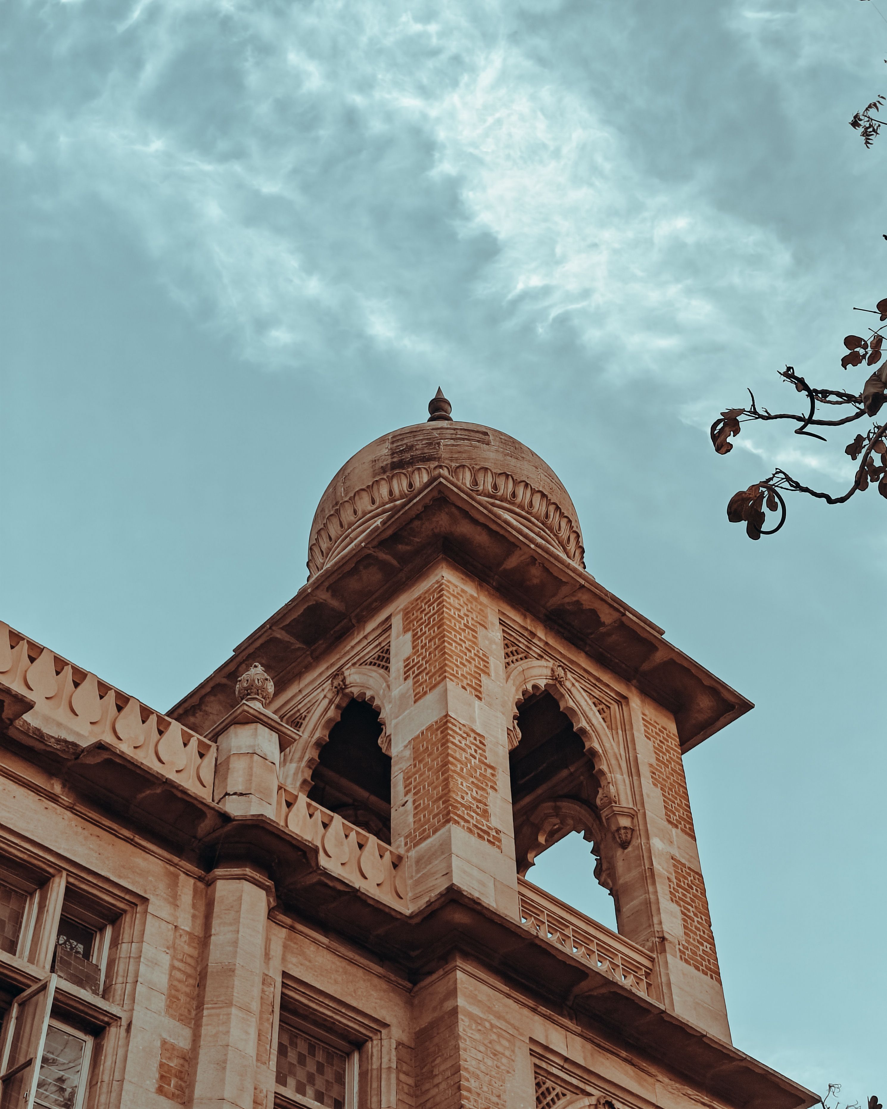Historic Indian University Building Under Blue Sky · Free Stock Photo