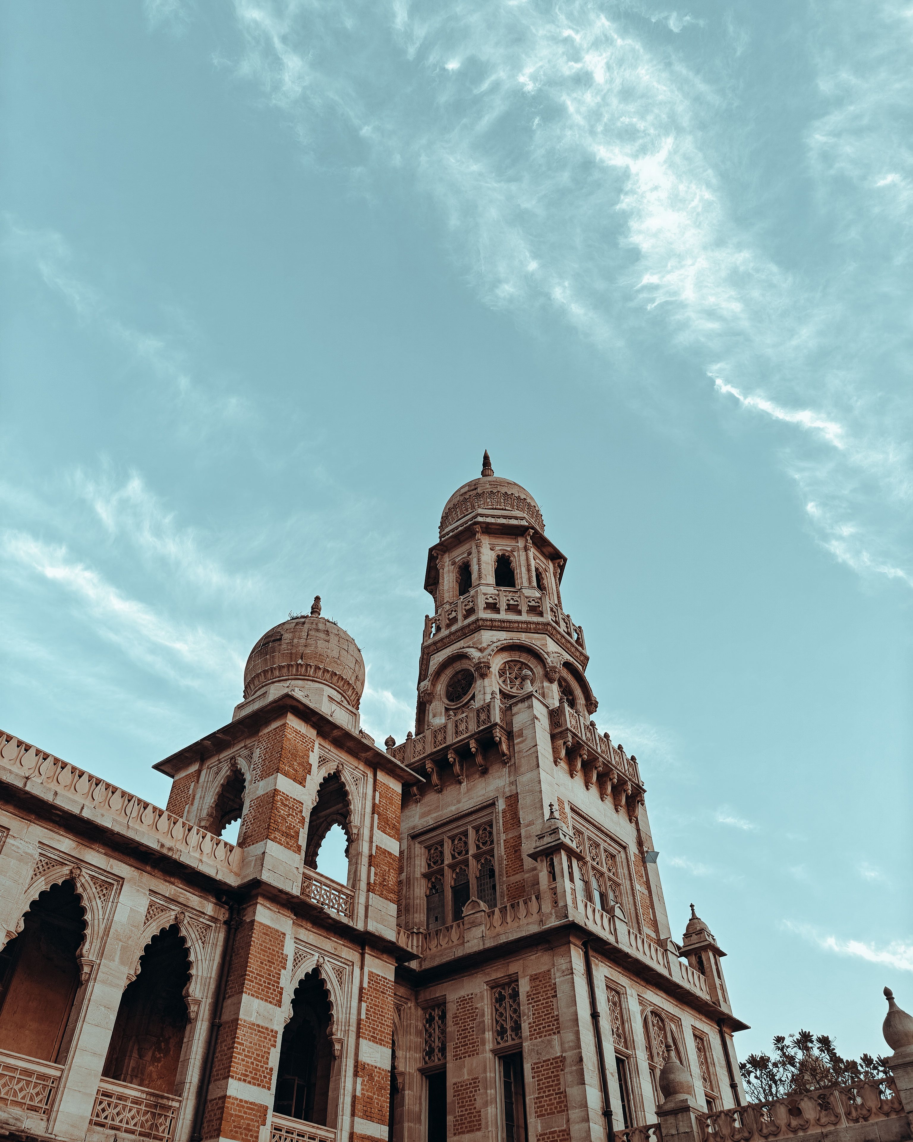 Historic Indian University Building Against Blue Sky · Free Stock Photo