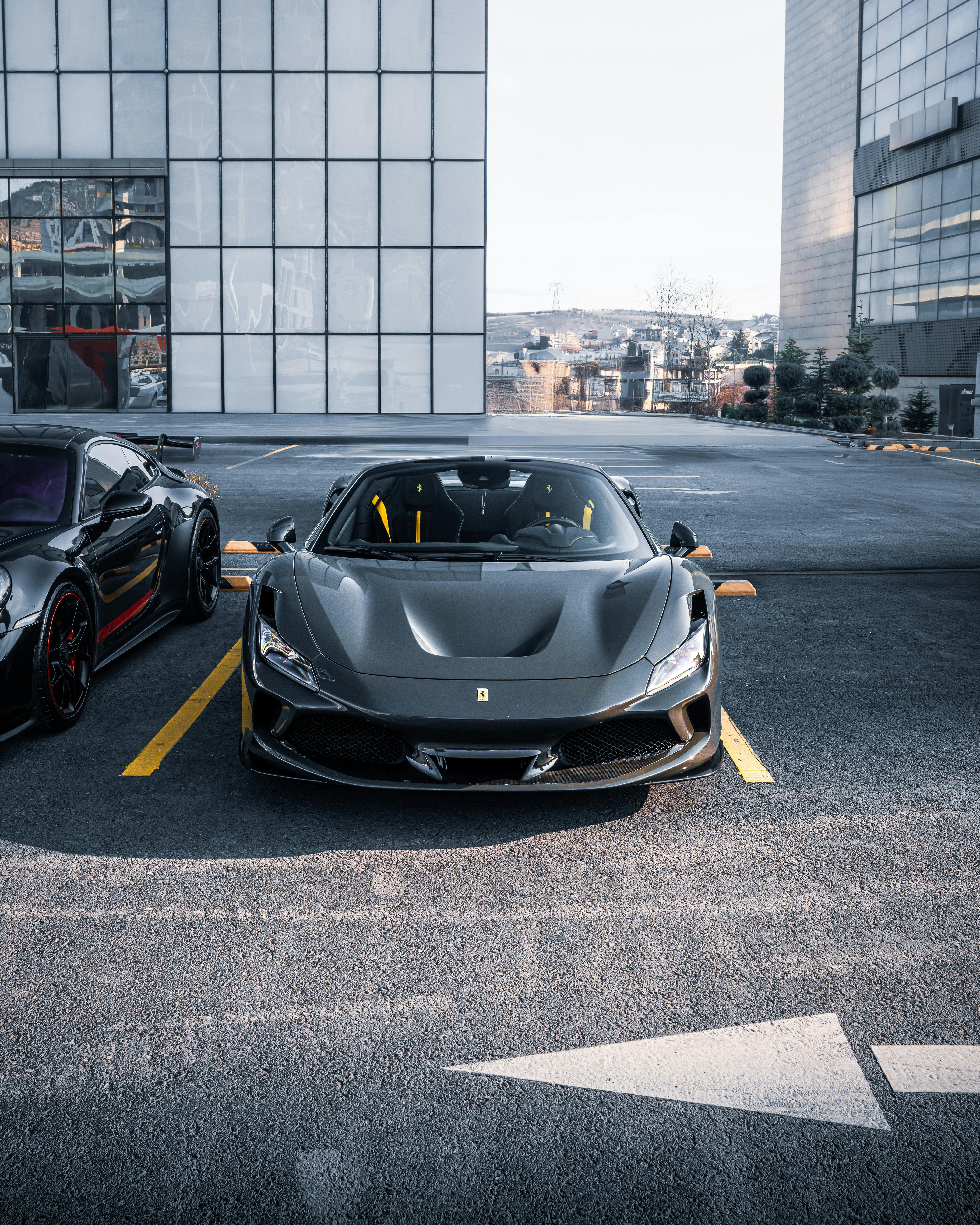 Bright red Ferrari in Ankara parking lot · Free Stock Photo