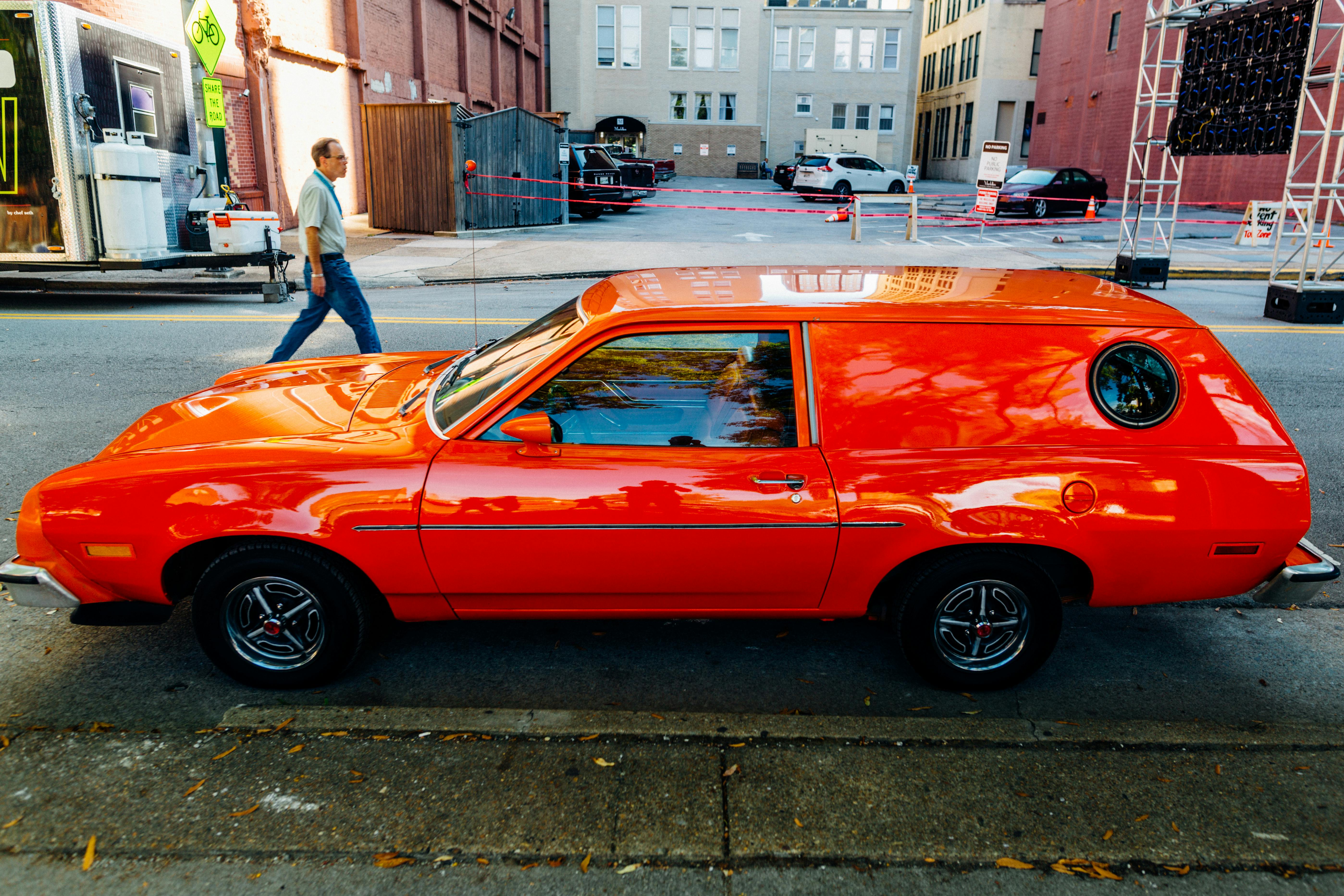 Red Station Wagon Parked on Road · Free Stock Photo