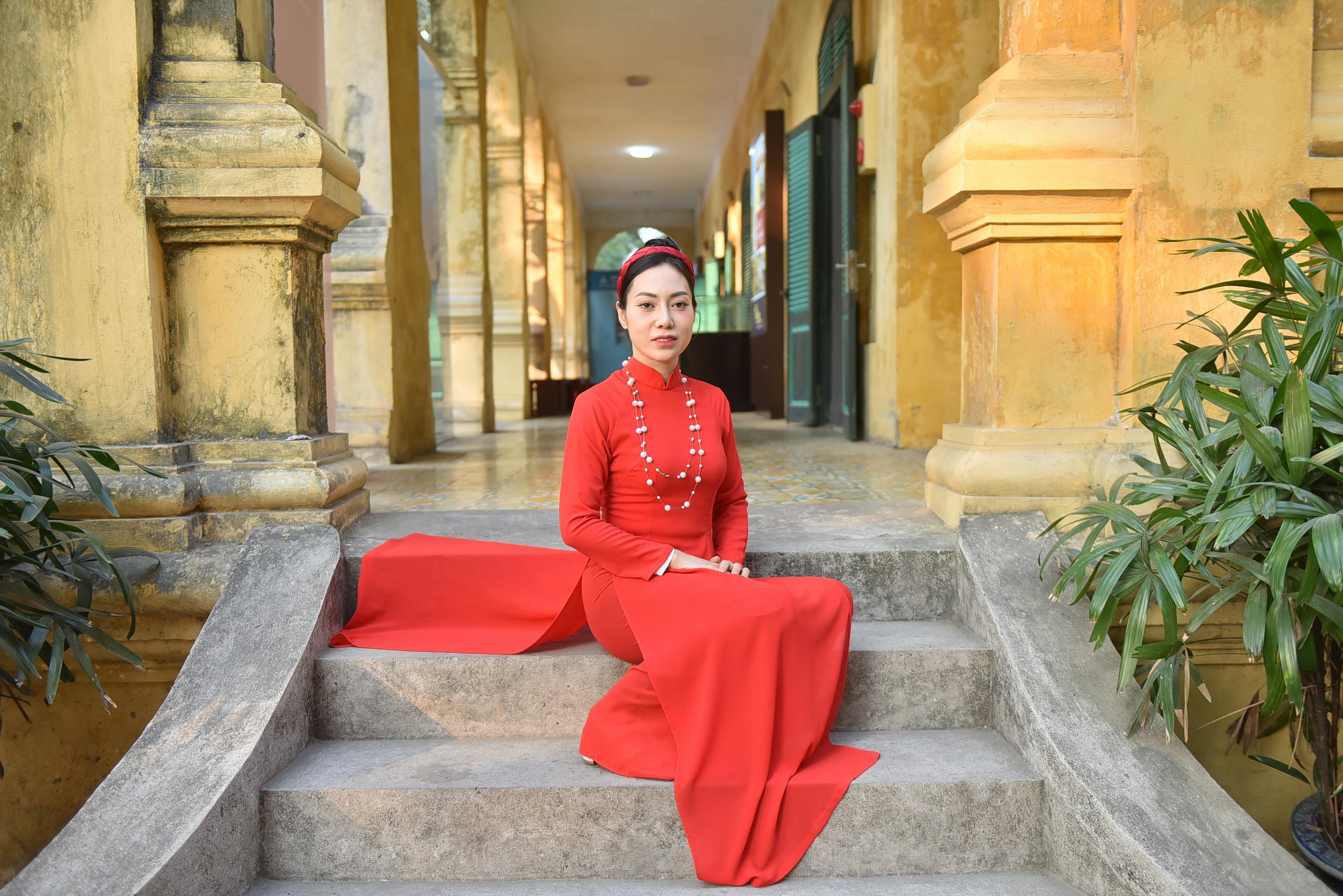 Elegant Woman in Red Dress Sitting on Steps · Free Stock Photo
