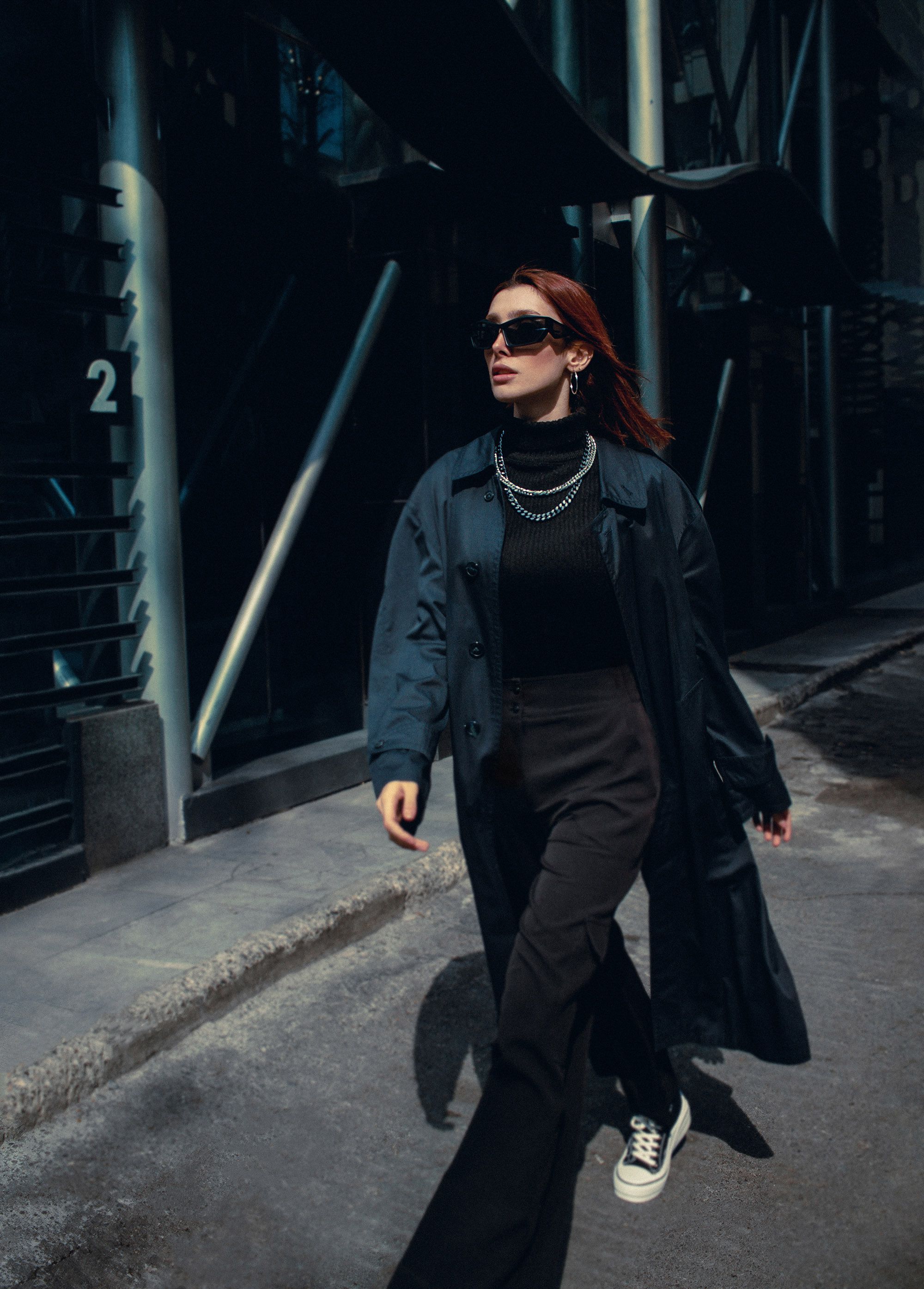 Stylish Woman Walking in Urban Setting · Free Stock Photo
