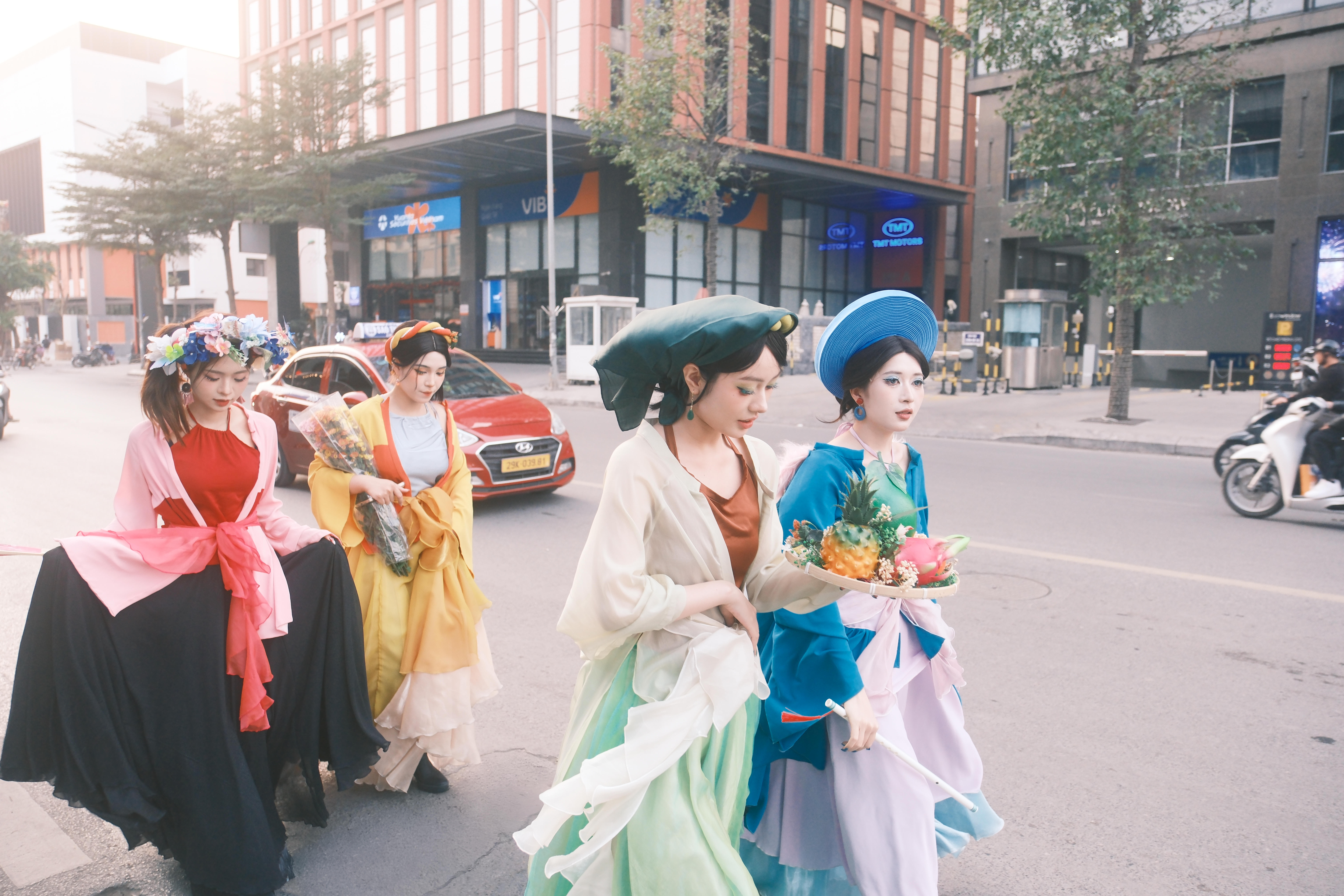 Women in Traditional Dress Walking on Urban Street · Free Stock Photo
