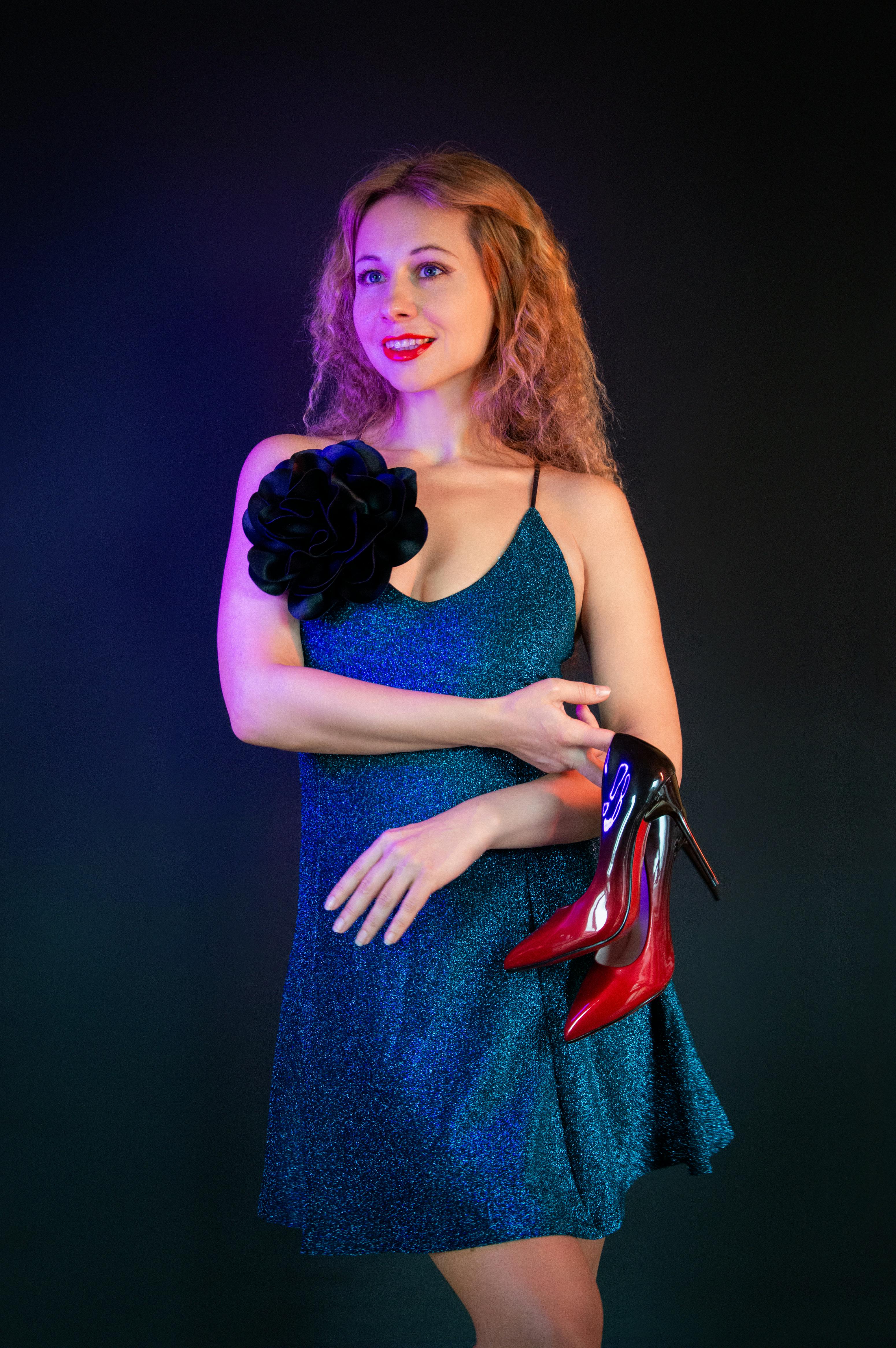 Elegant Woman with Red High Heels in Evening Dress · Free Stock Photo