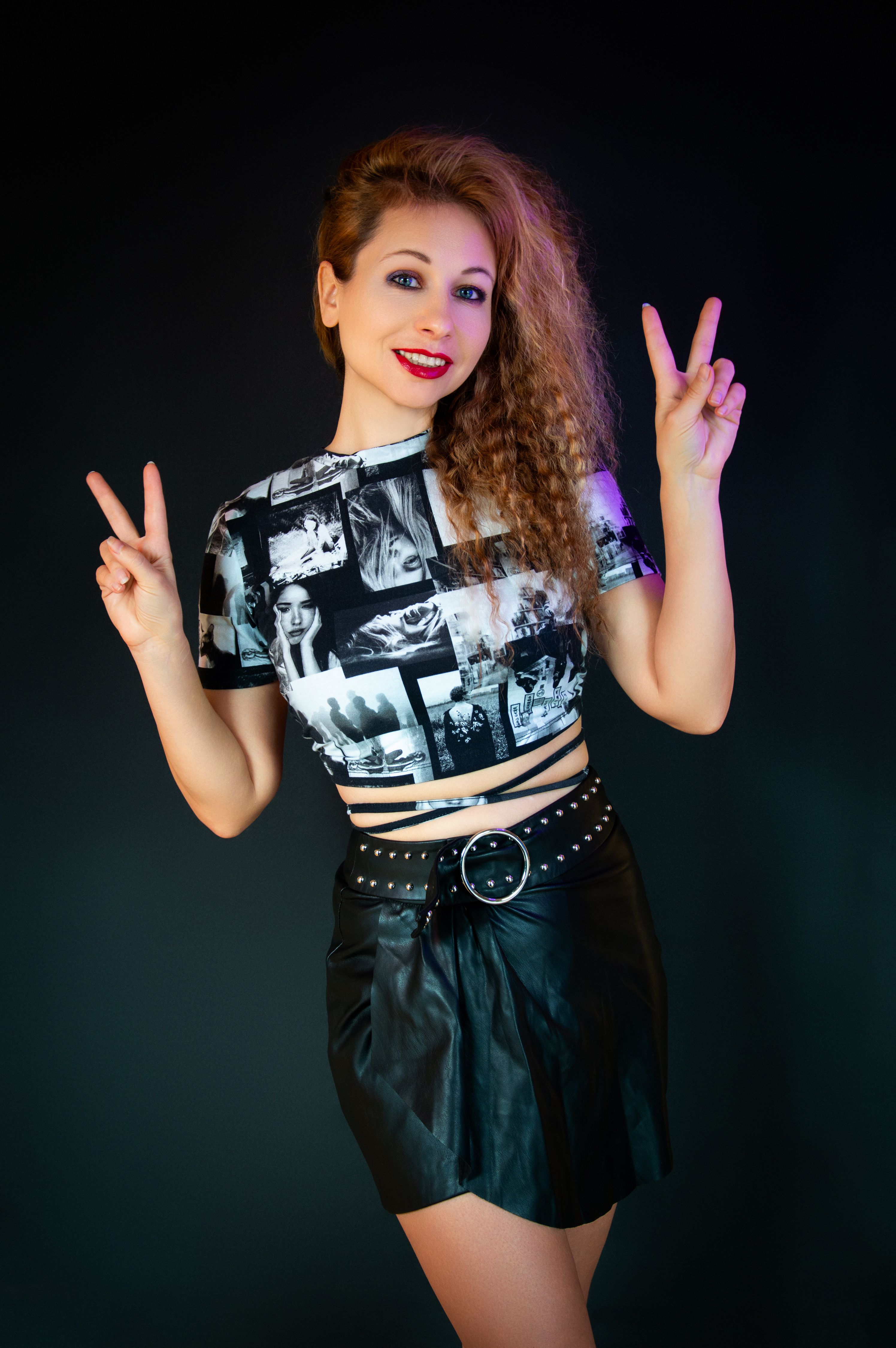 Fashionable Woman Posing with Peace Signs · Free Stock Photo