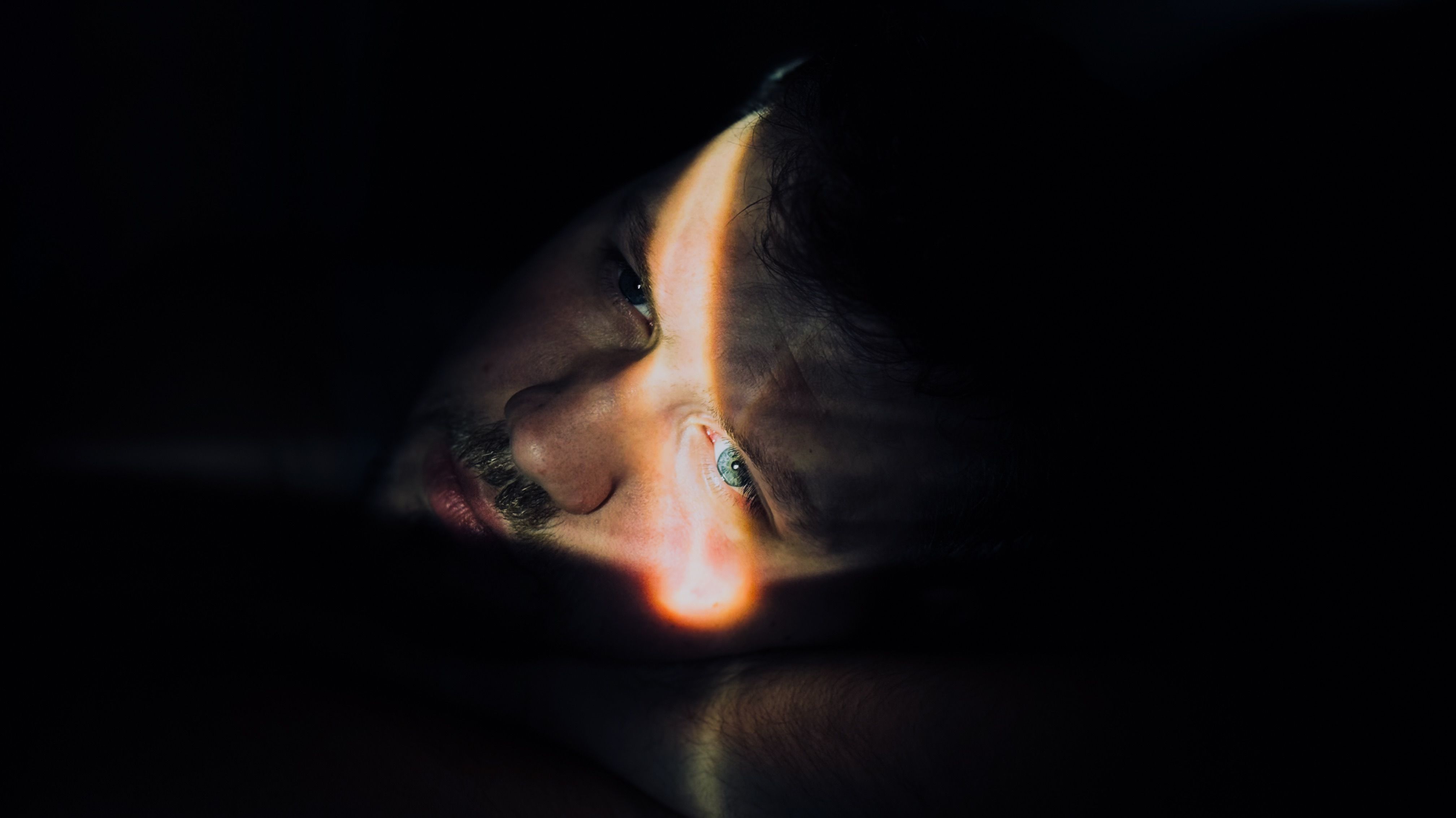 Dramatic Portrait of a Man in Low Light · Free Stock Photo
