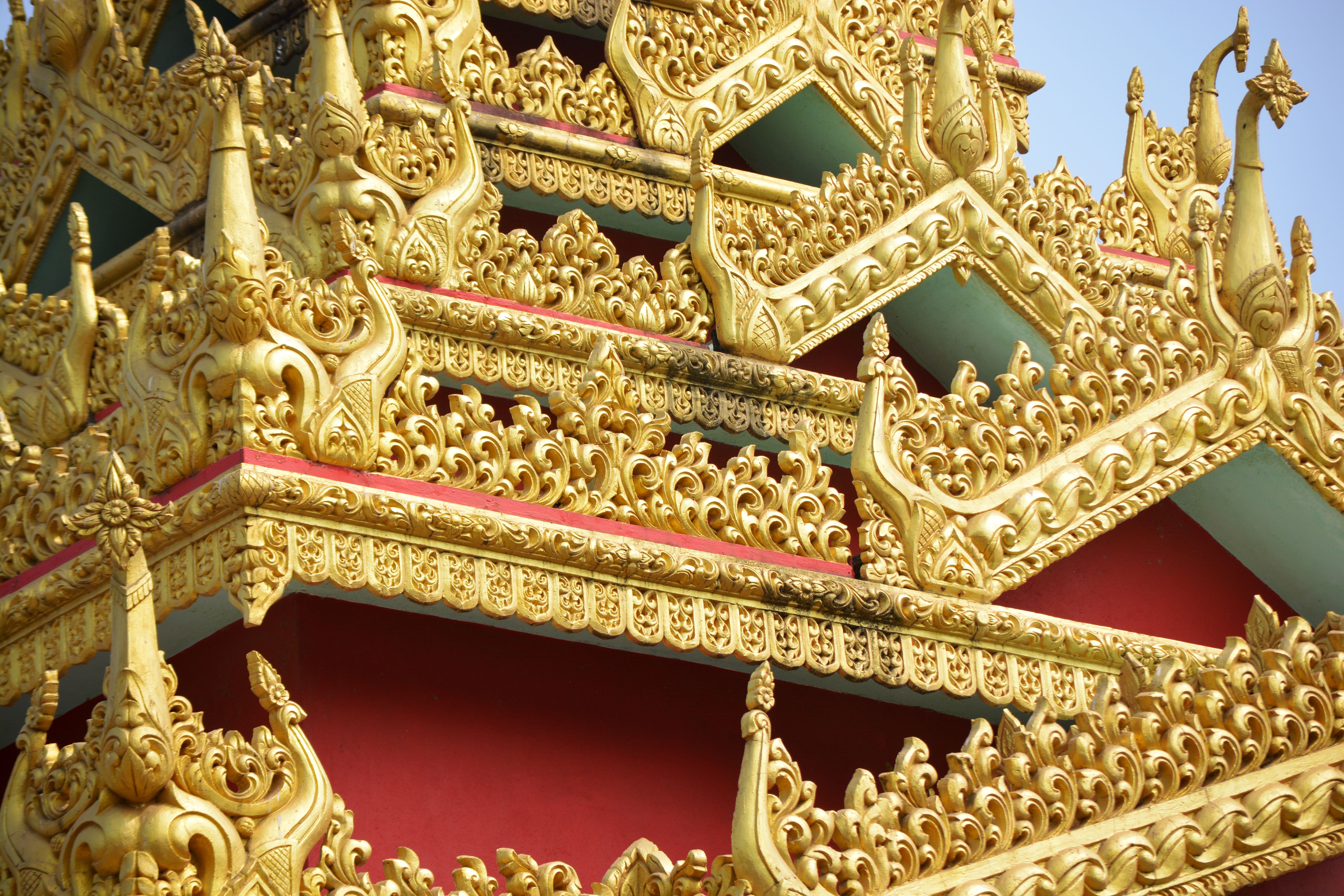 Intricate Golden Buddhist Temple Decoration · Free Stock Photo