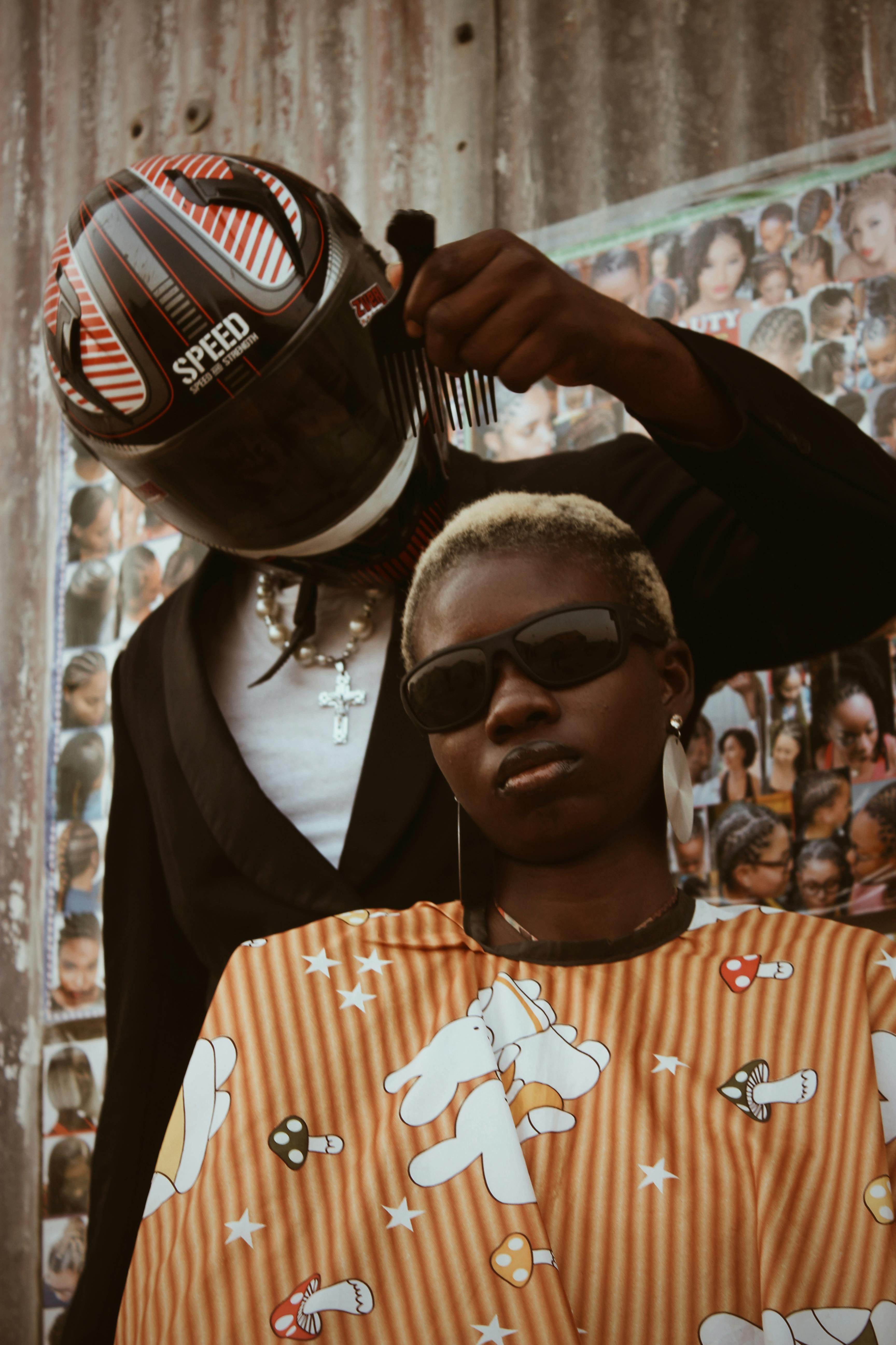 Unique Barber Shop Scene with Stylish Individuals · Free Stock Photo