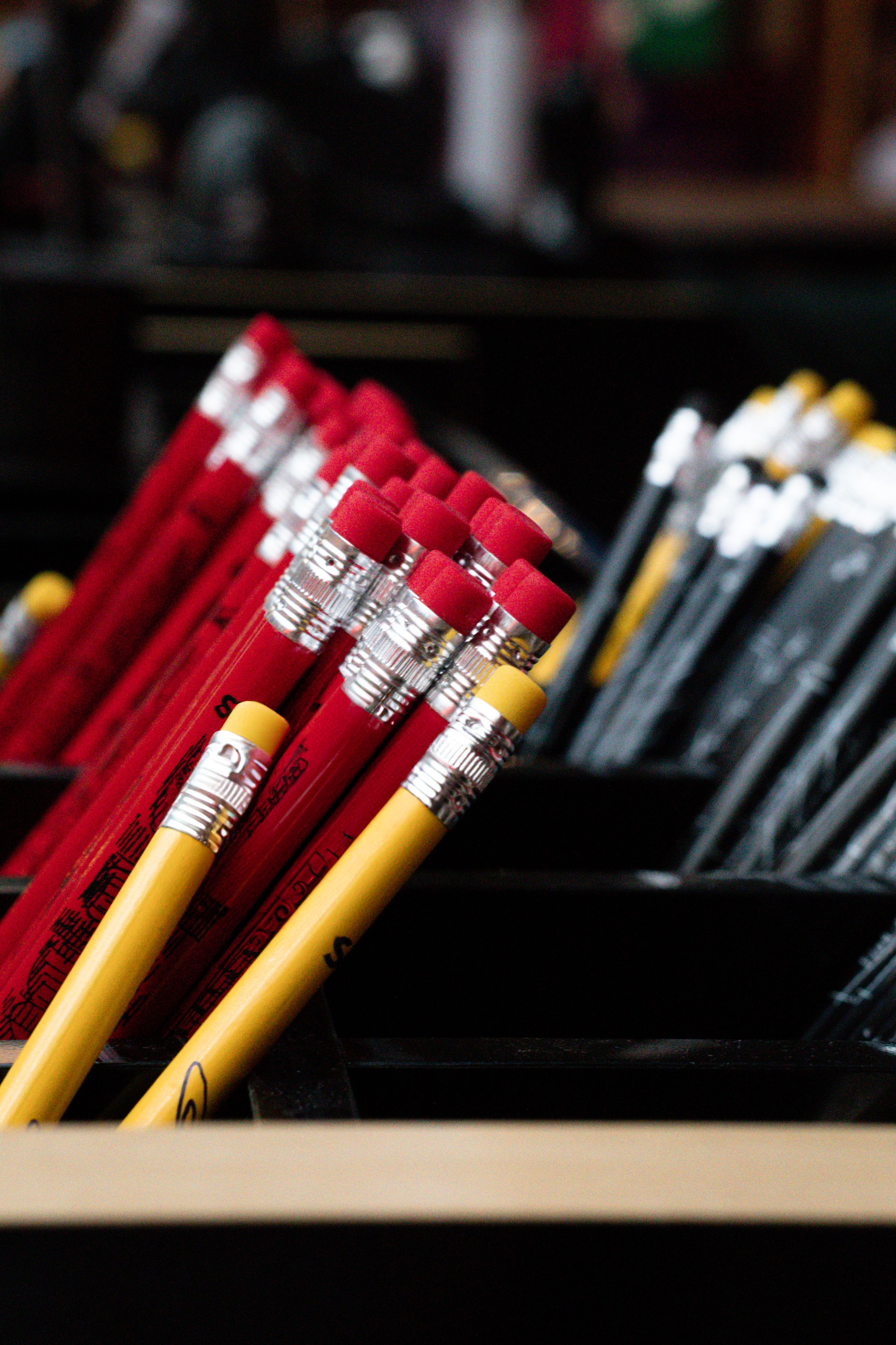 Red and Yellow Pencils Arranged in Containers · Free Stock Photo