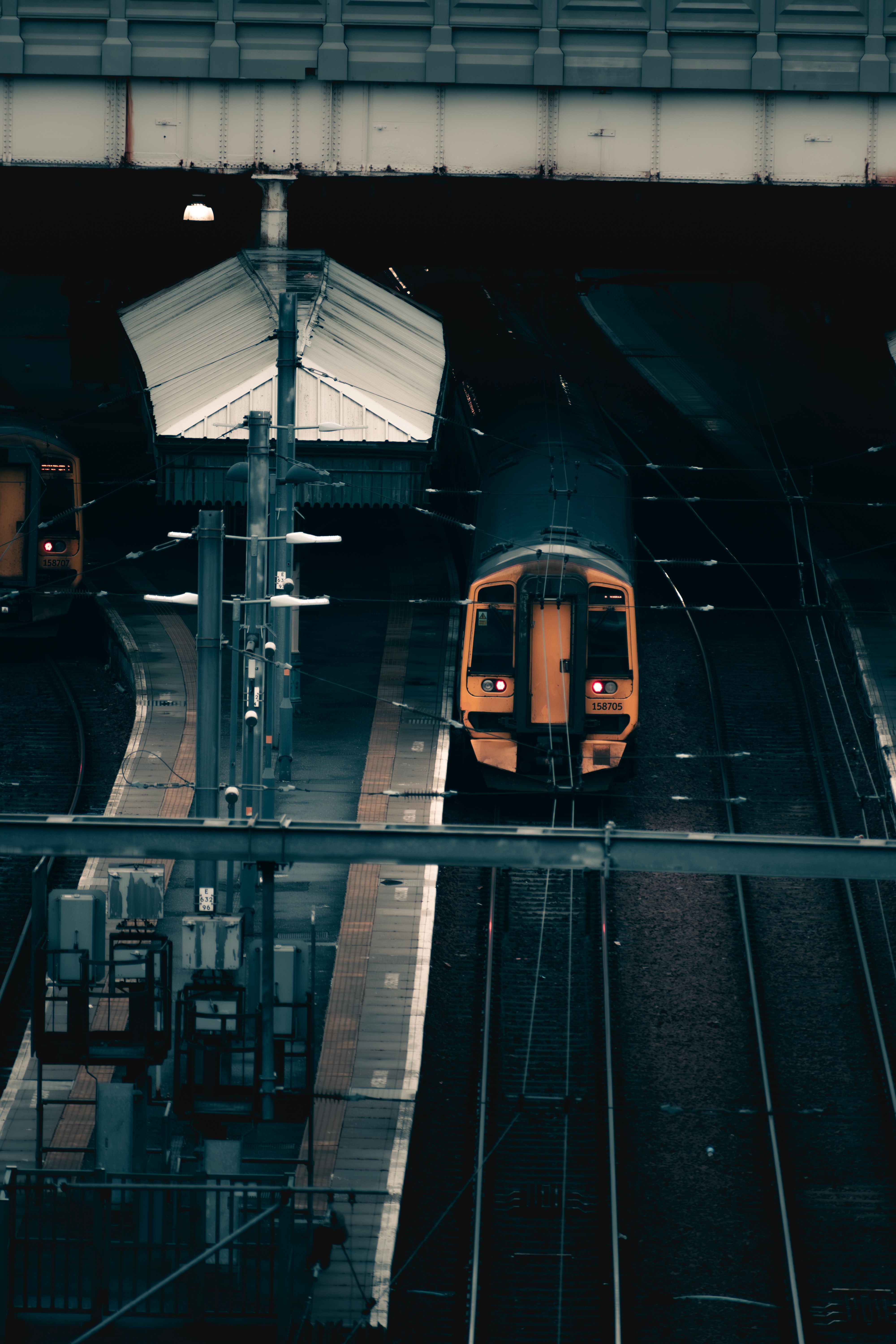 Moody Urban Train Station Scene at Night in Edinburgh · Free Stock Photo