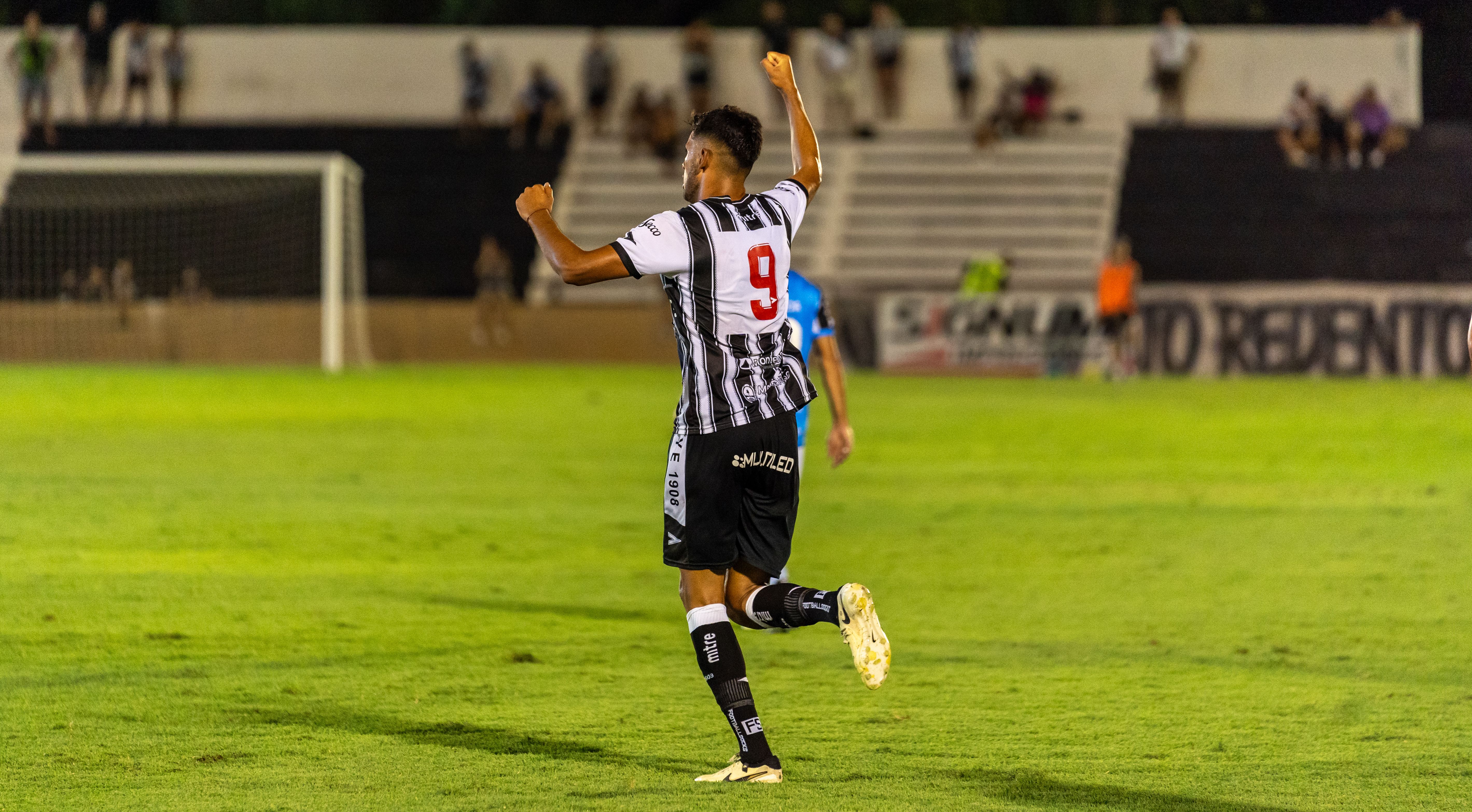 Soccer Player Celebrating a Goal on Field · Free Stock Photo