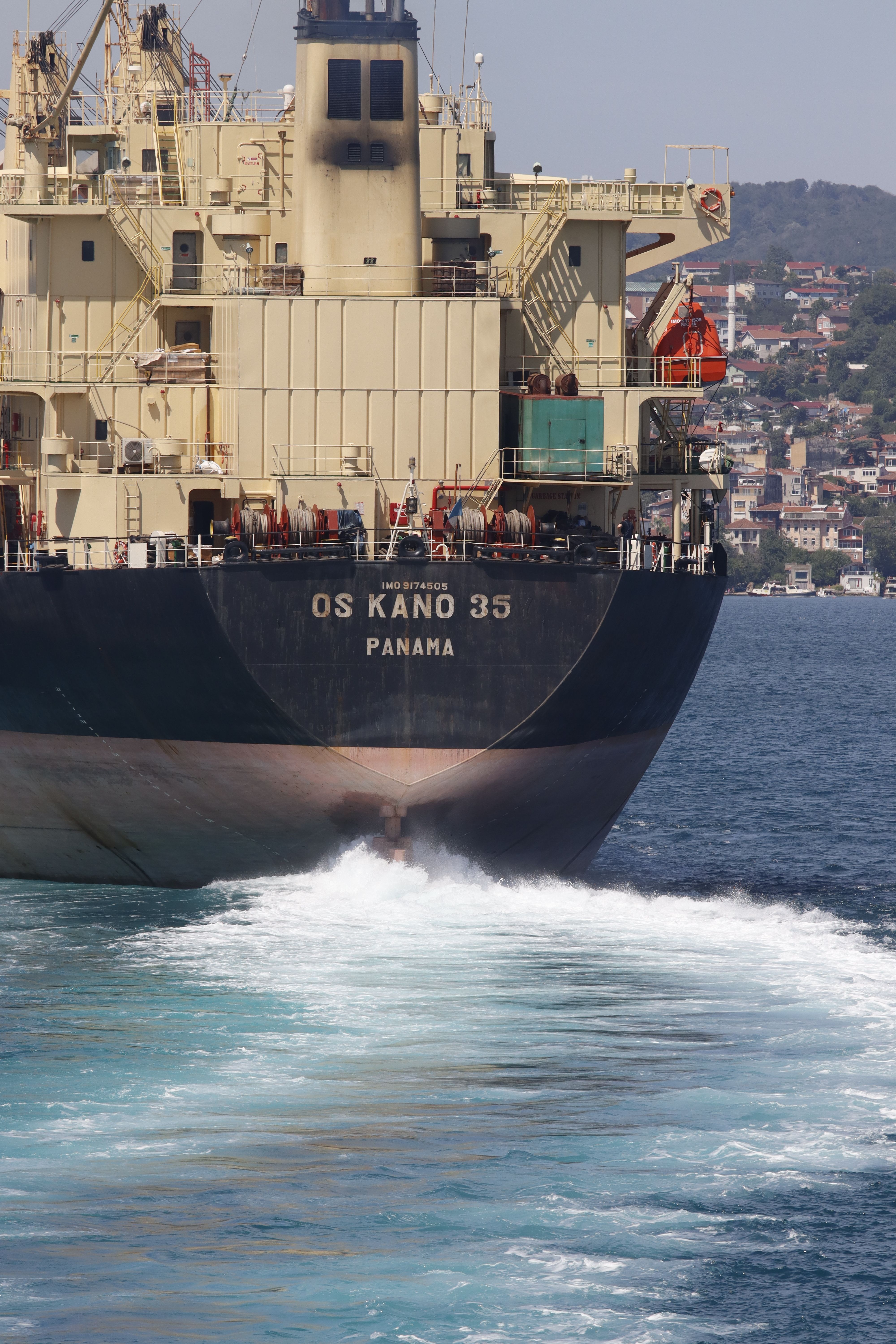 Cargo Ship OS Kano 35 Sailing in Open Water · Free Stock Photo