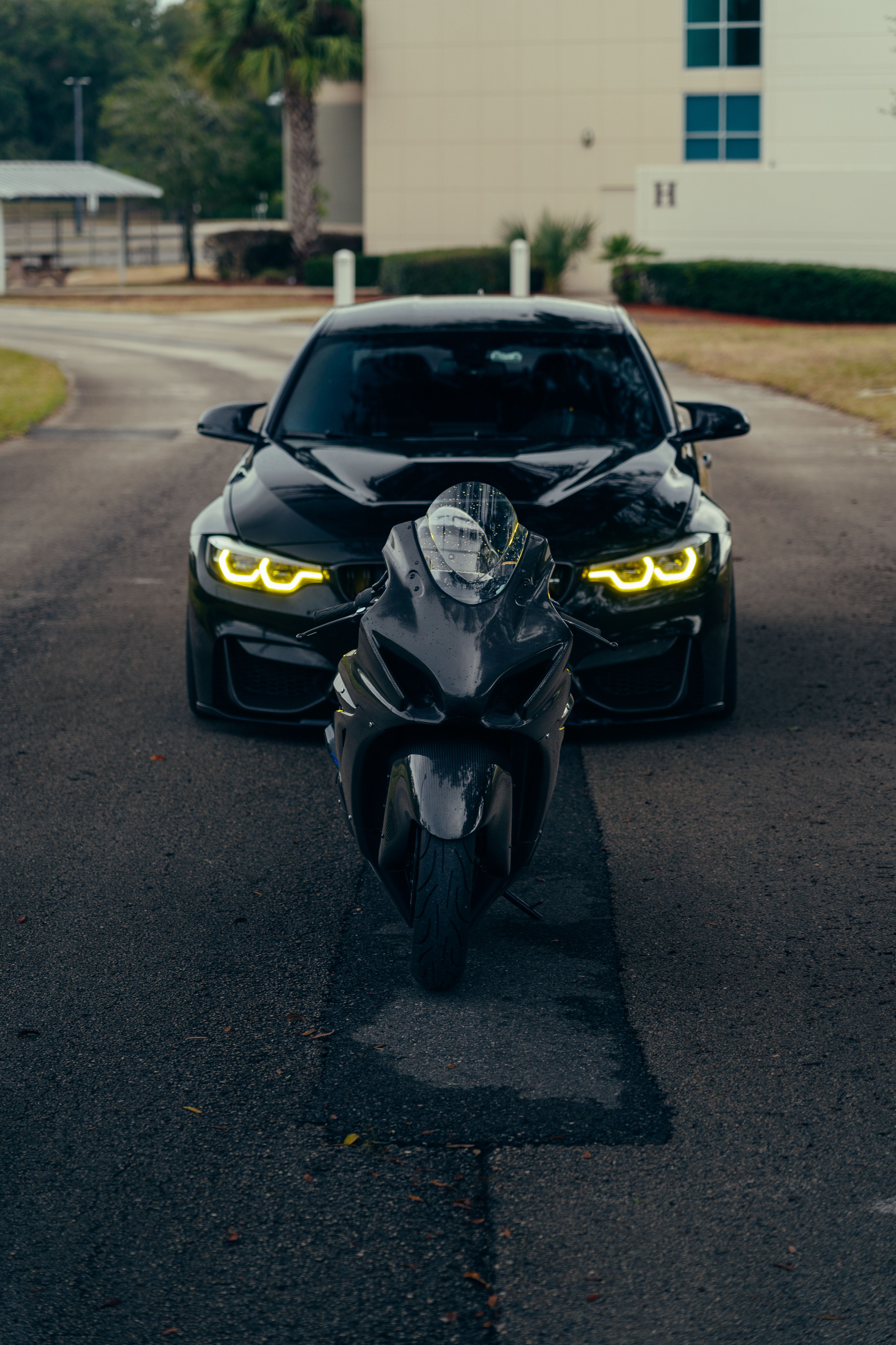 Dynamic Motorcycle and Car on Urban Roadway · Free Stock Photo
