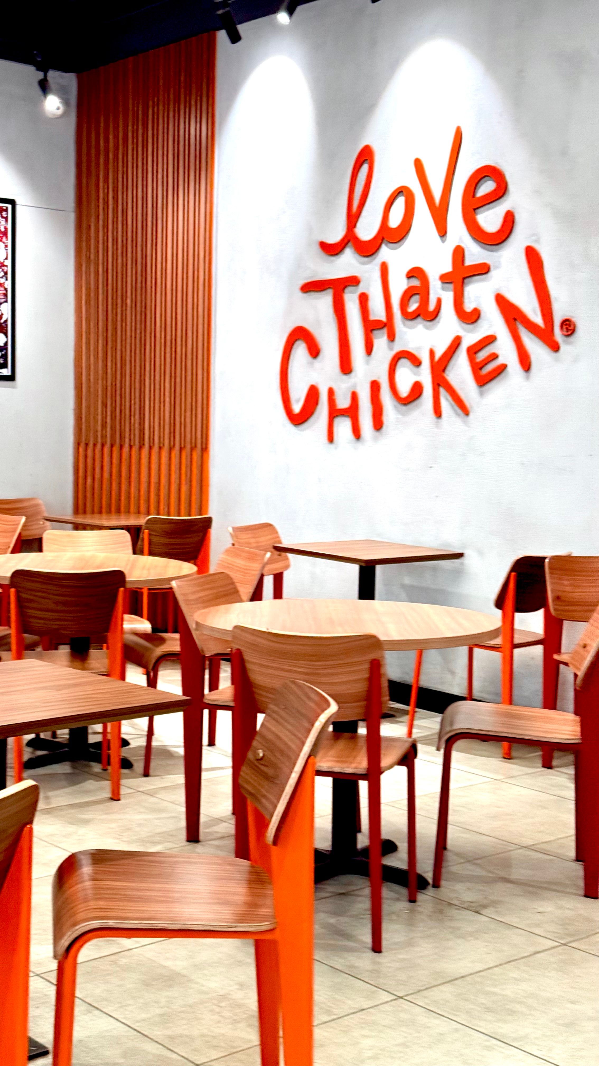 Restaurante De Comida Rápida Moderno Con Un Eslogan Icónico · Foto de ...