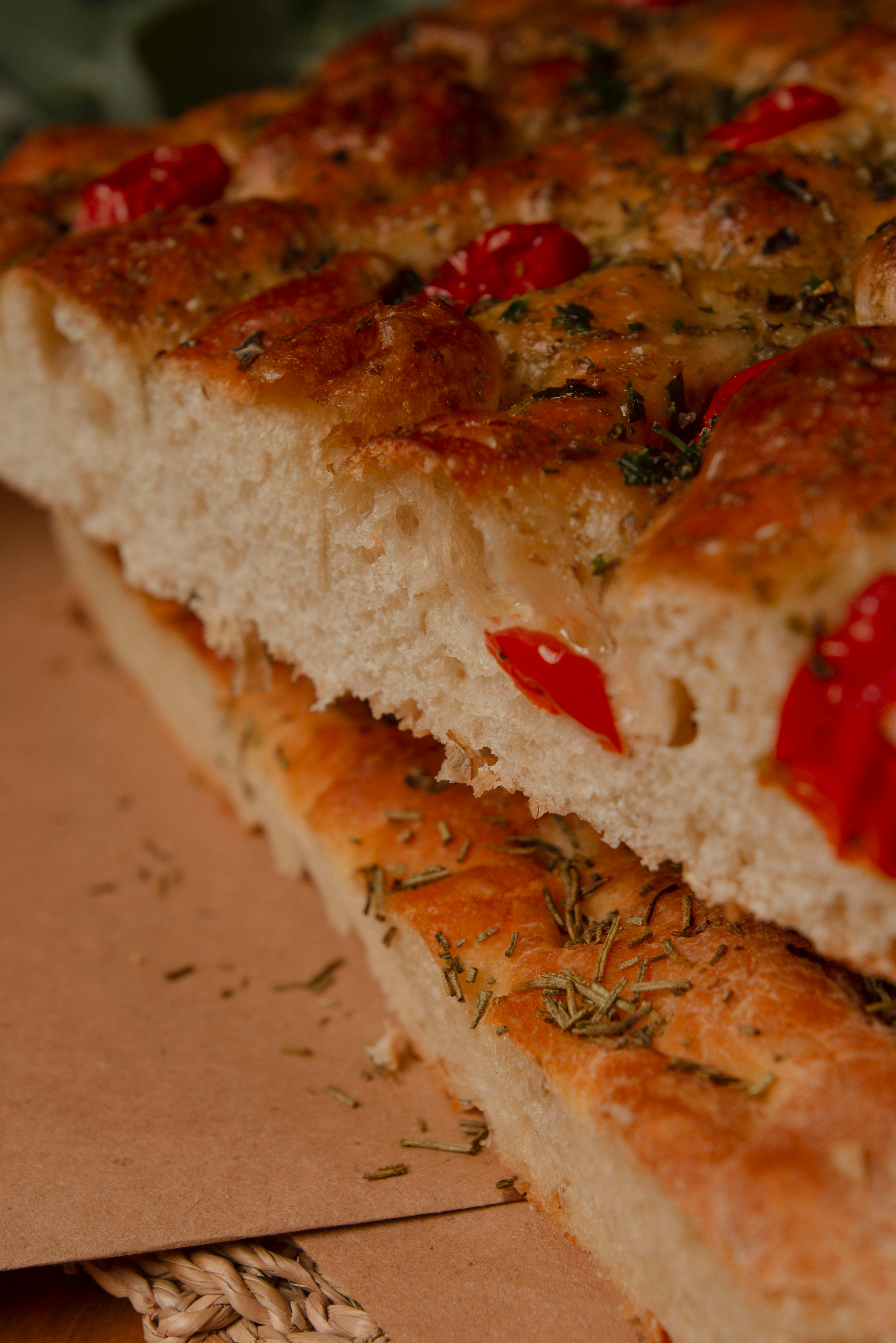 Rustic Focaccia Bread with Herbs and Tomatoes · Free Stock Photo