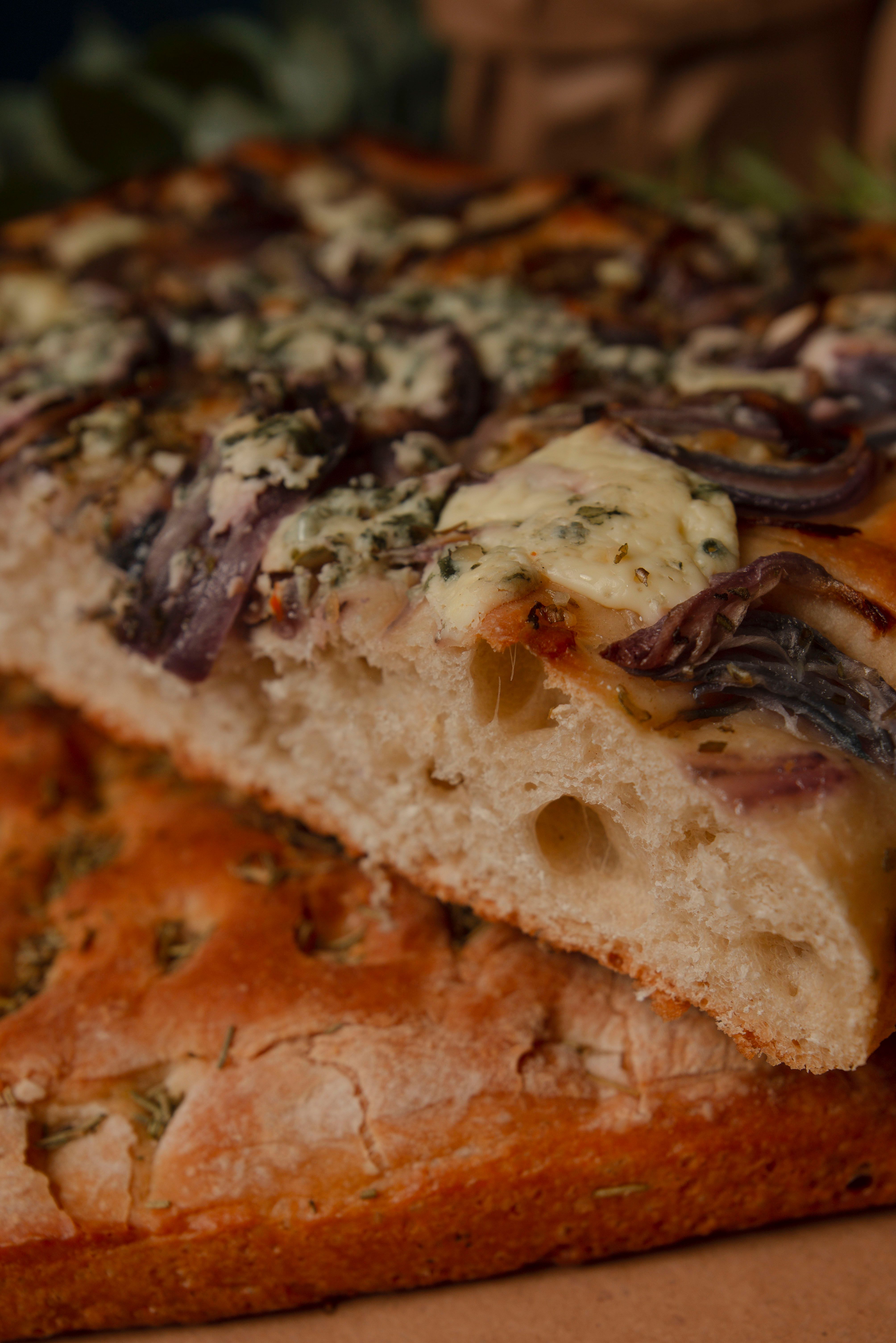 Delicious Herb and Onion Focaccia Bread Slice · Free Stock Photo