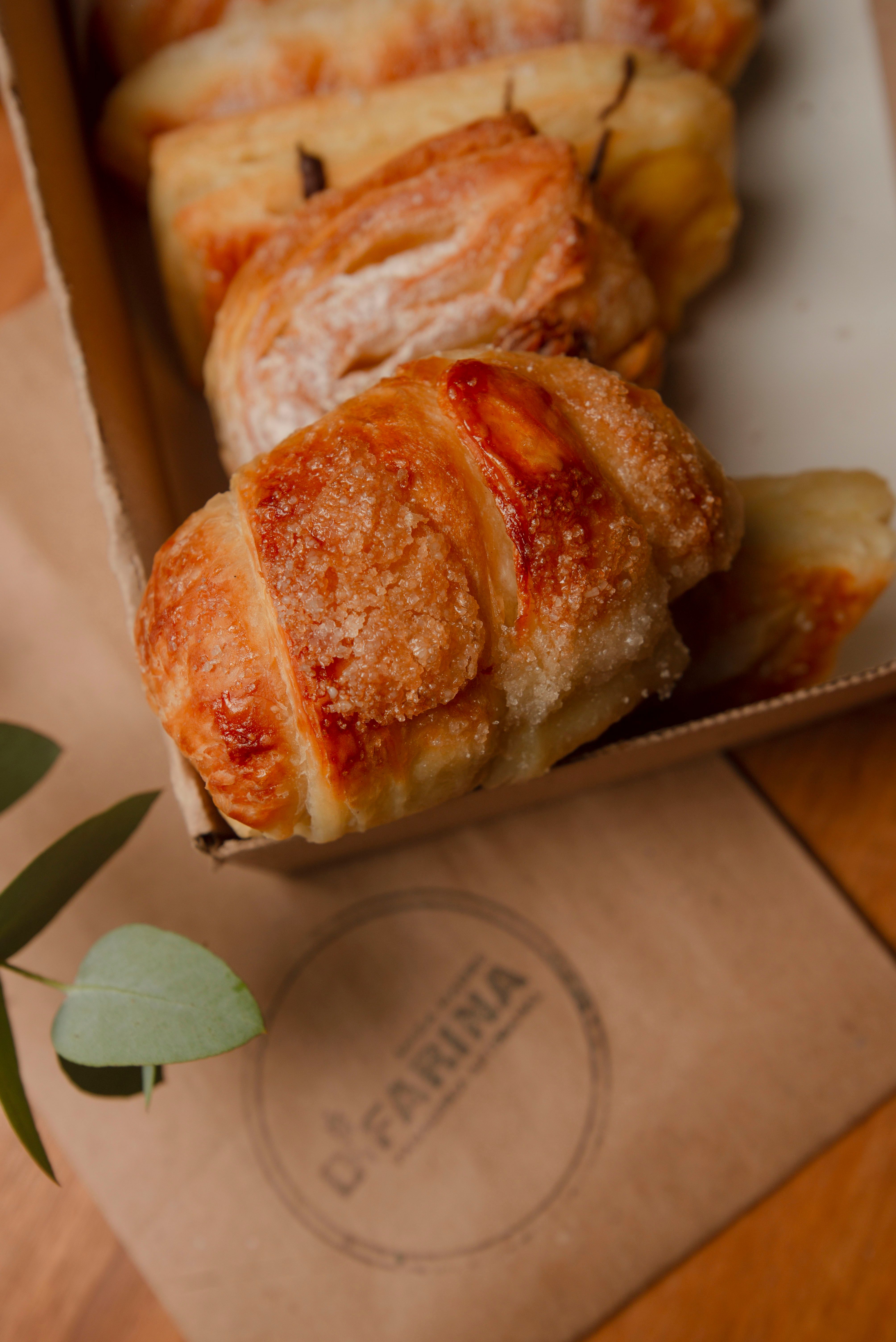 Delicious Freshly Baked Croissants in Box · Free Stock Photo
