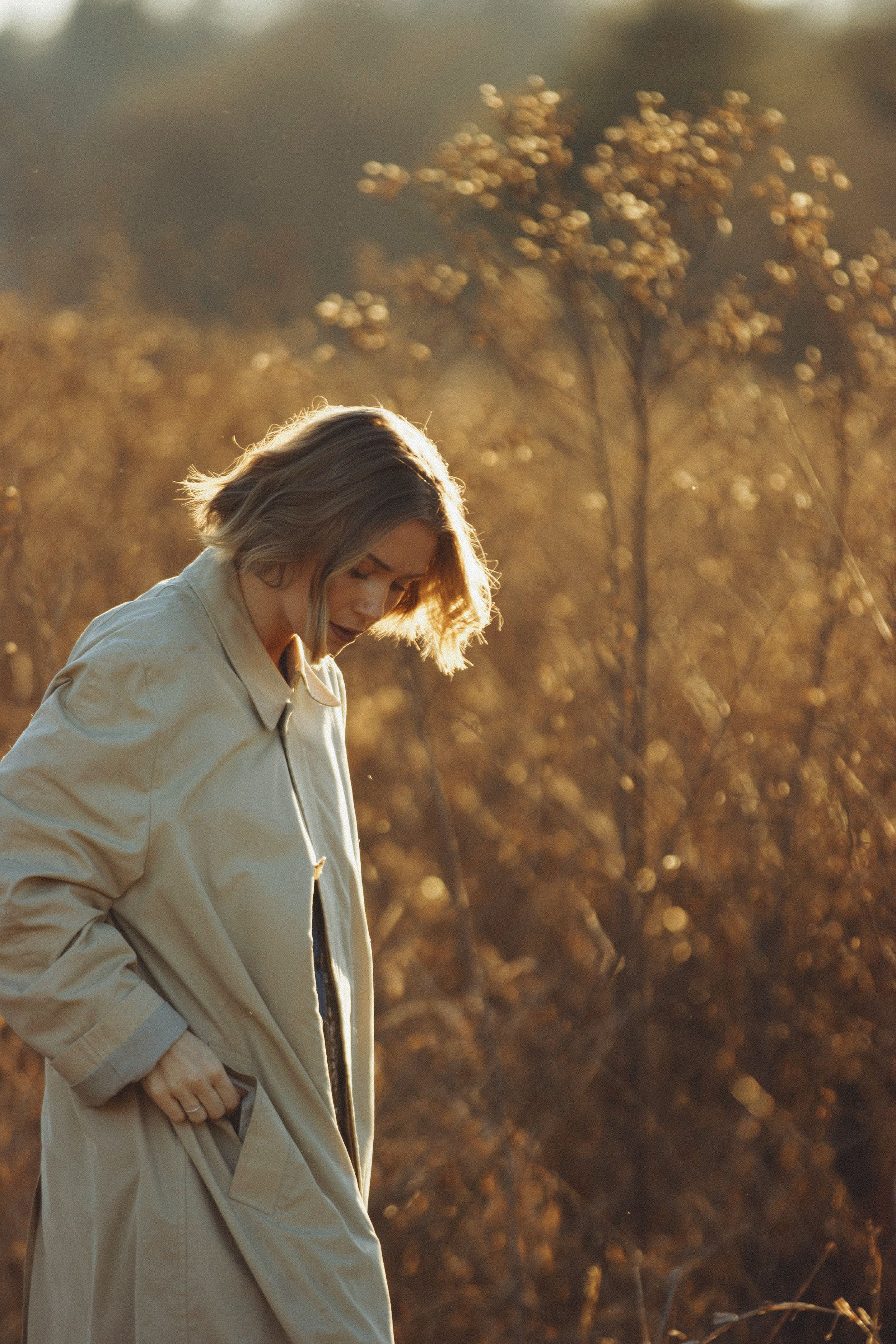Golden Hour Portrait in Autumn Field · Free Stock Photo
