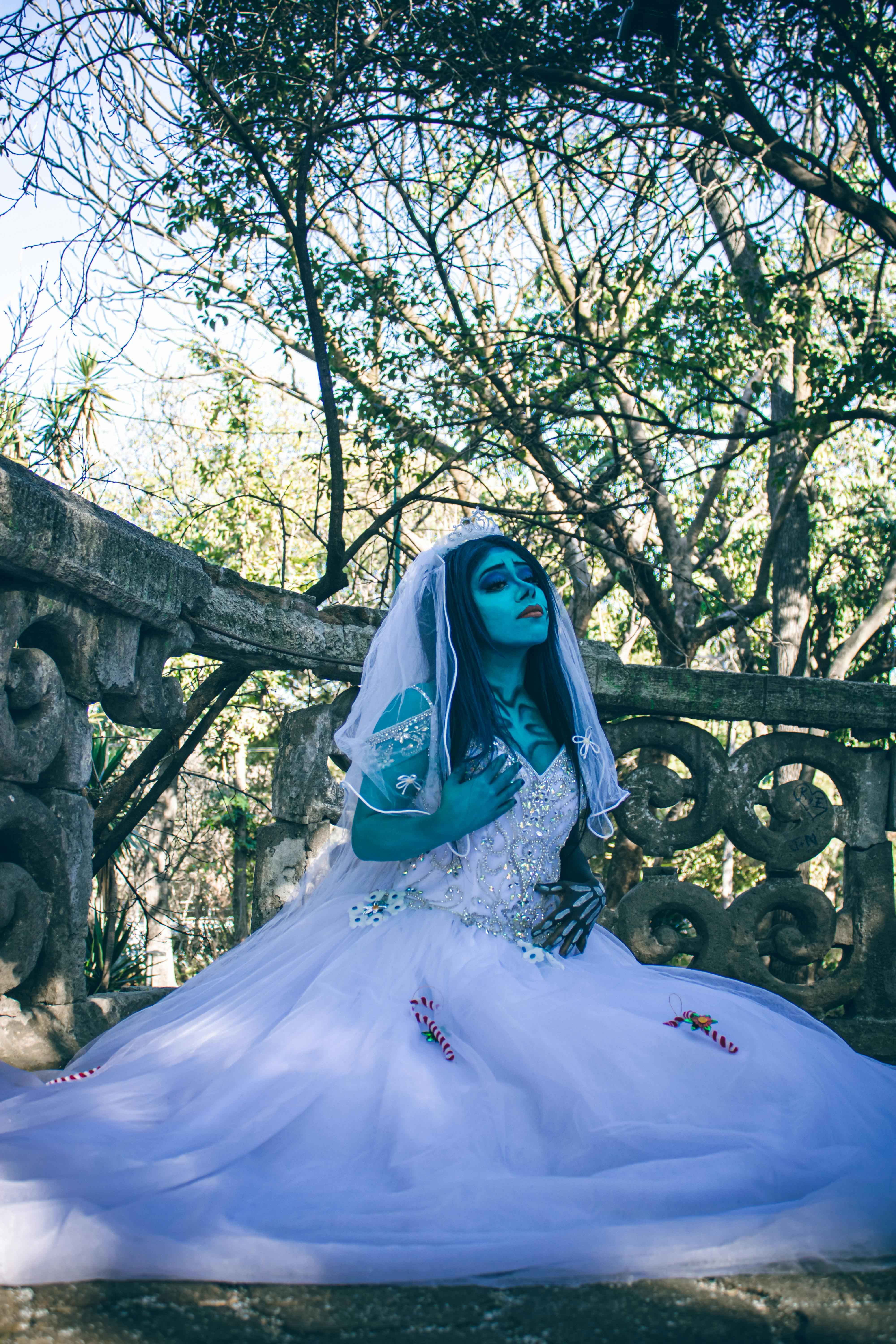 Blue Cosplay Bride in Ethereal Forest Setting · Free Stock Photo