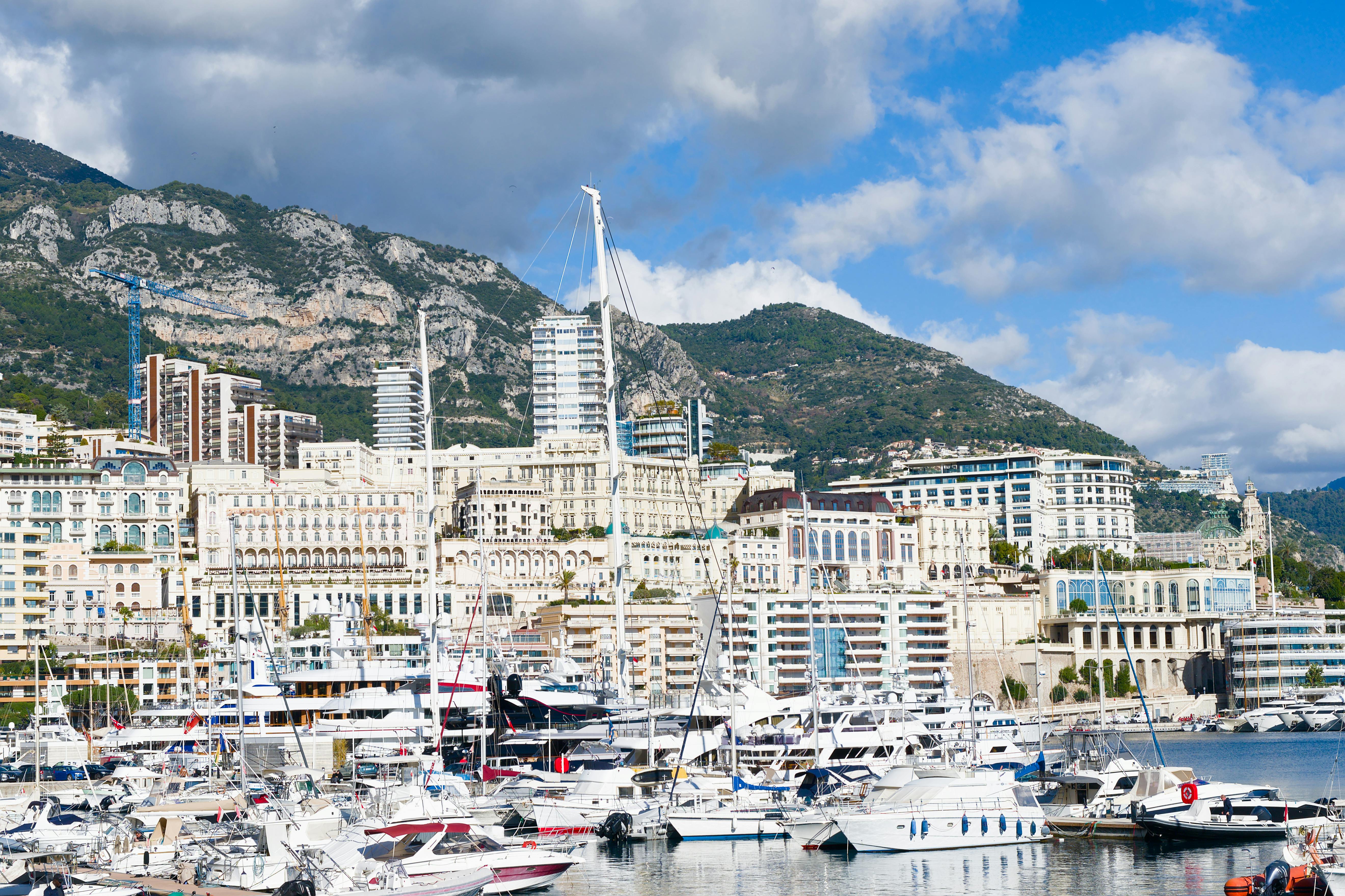 Luxury Yachts in Scenic Monaco Harbor with Skyline · Free Stock Photo
