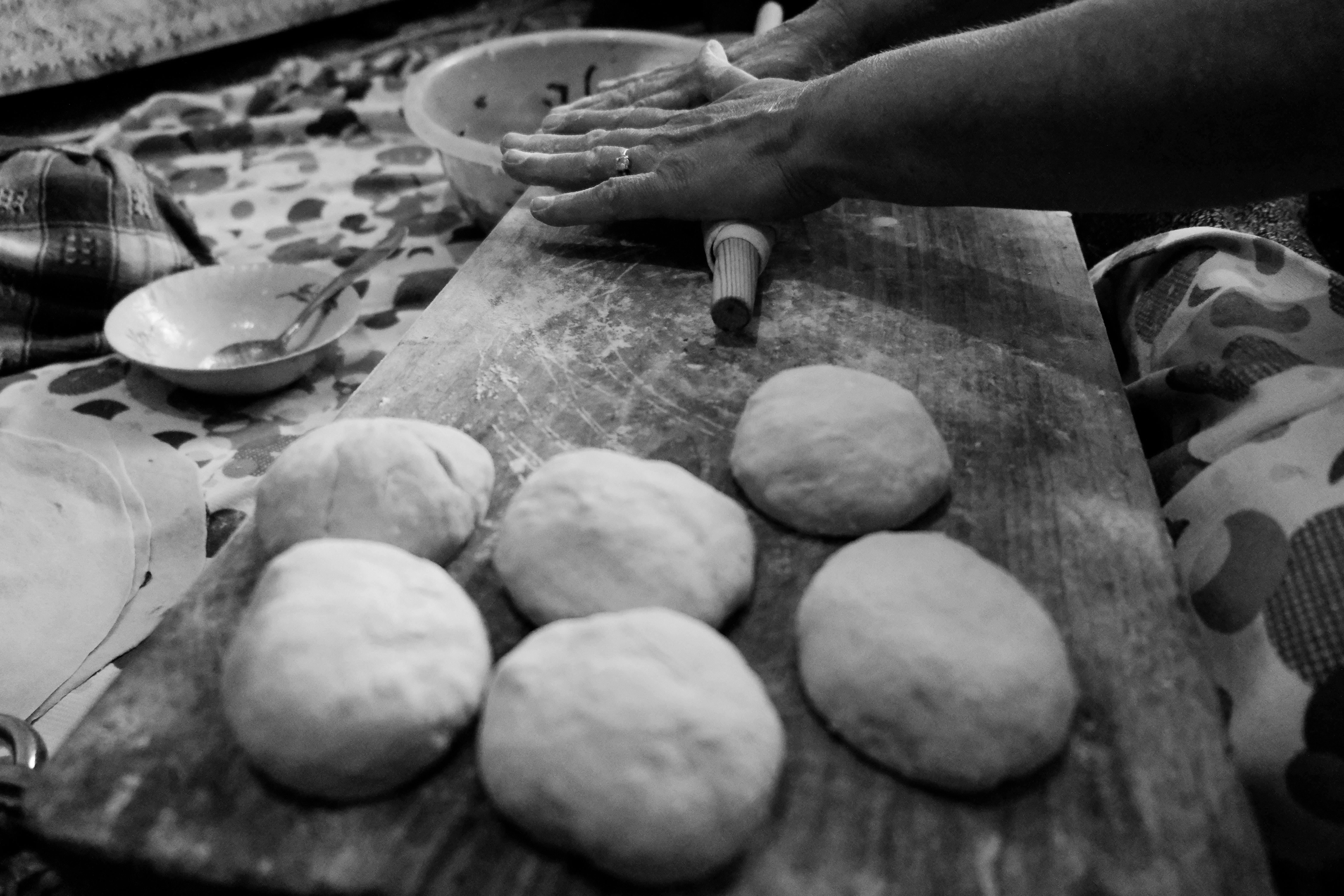 Black and White Baking Process with Dough · Free Stock Photo