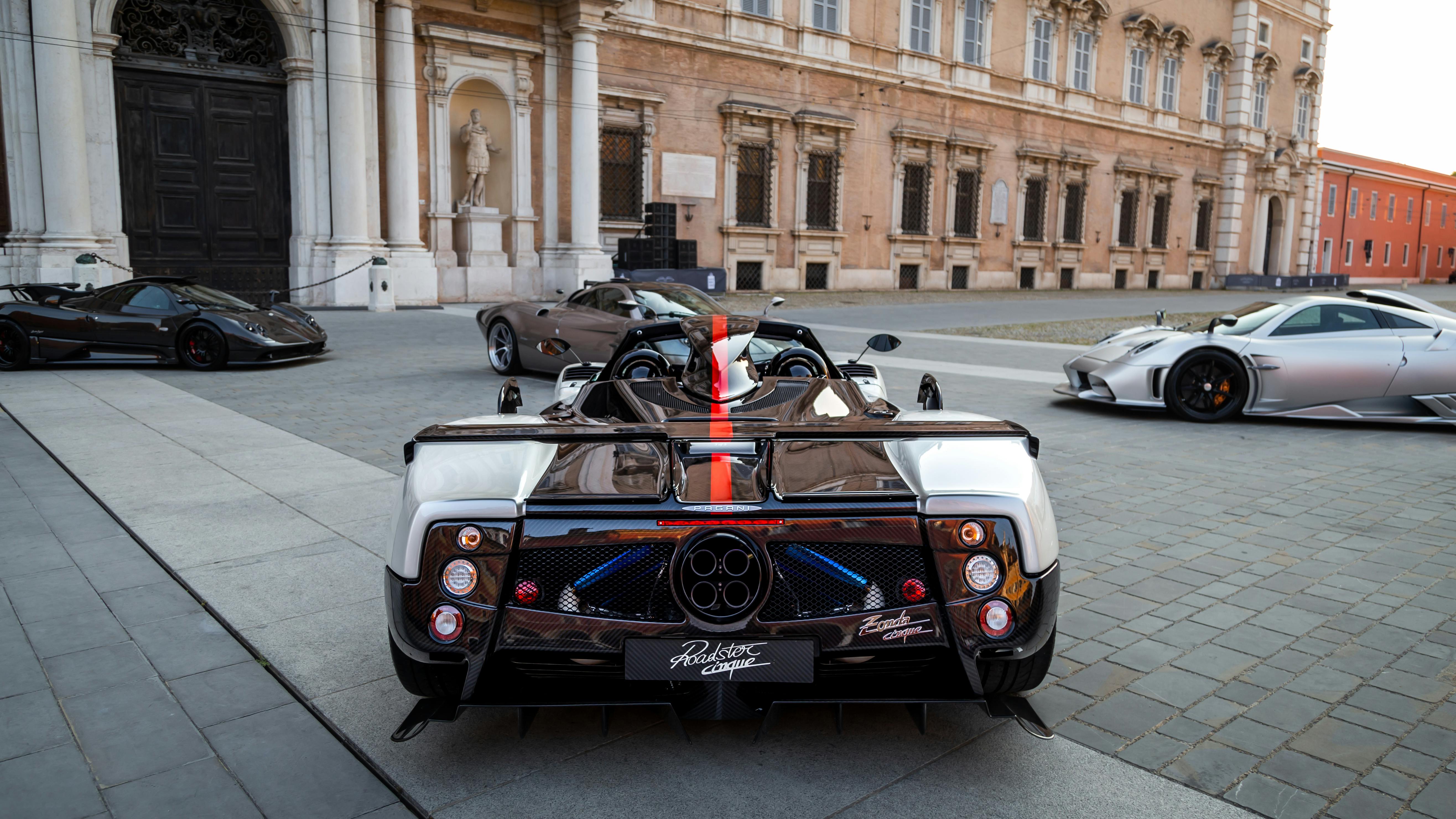 Luxury Hypercars Display in Historical European Square · Free Stock Photo