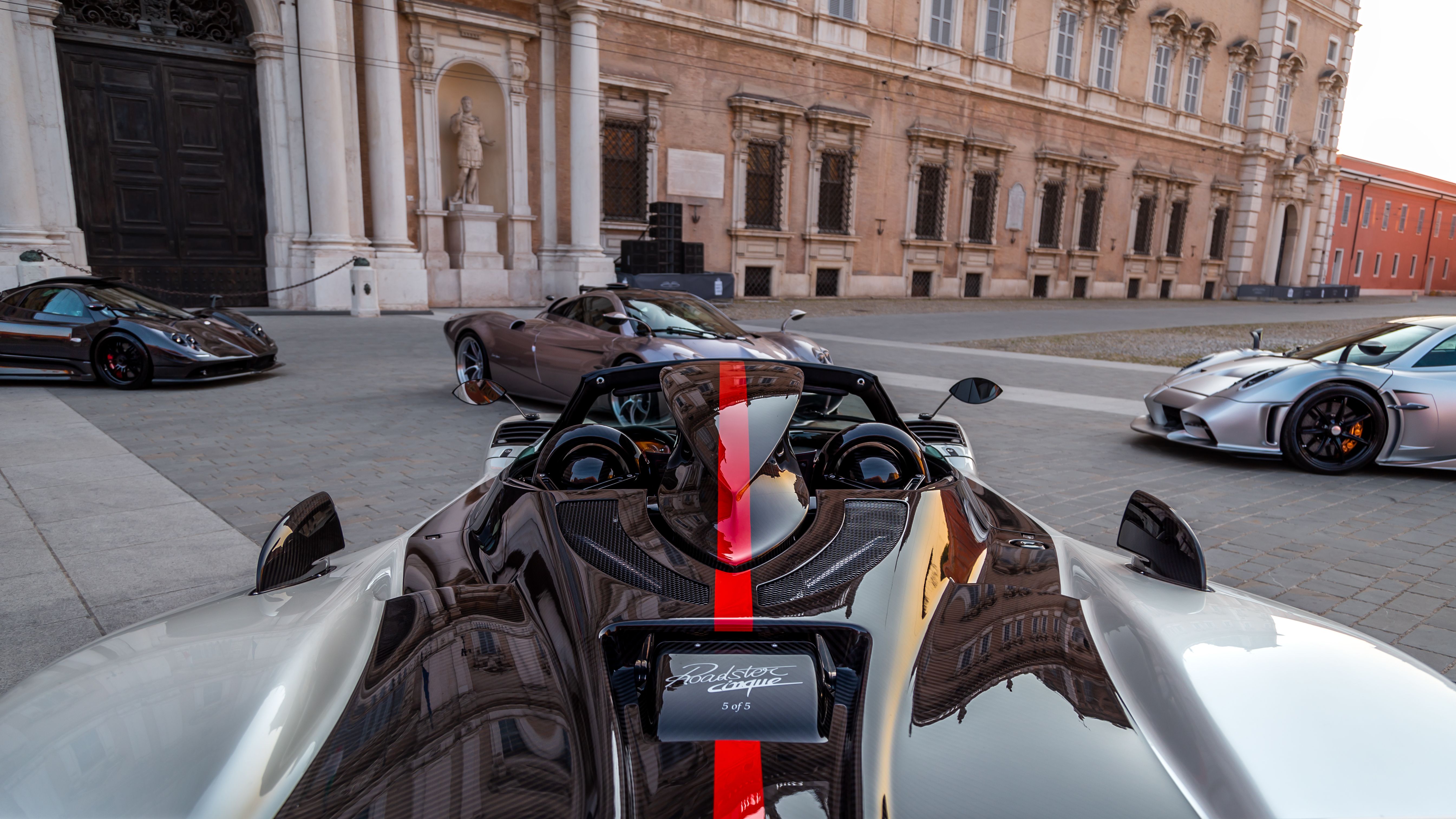 Luxurious Supercars Displayed in Courtyard · Free Stock Photo