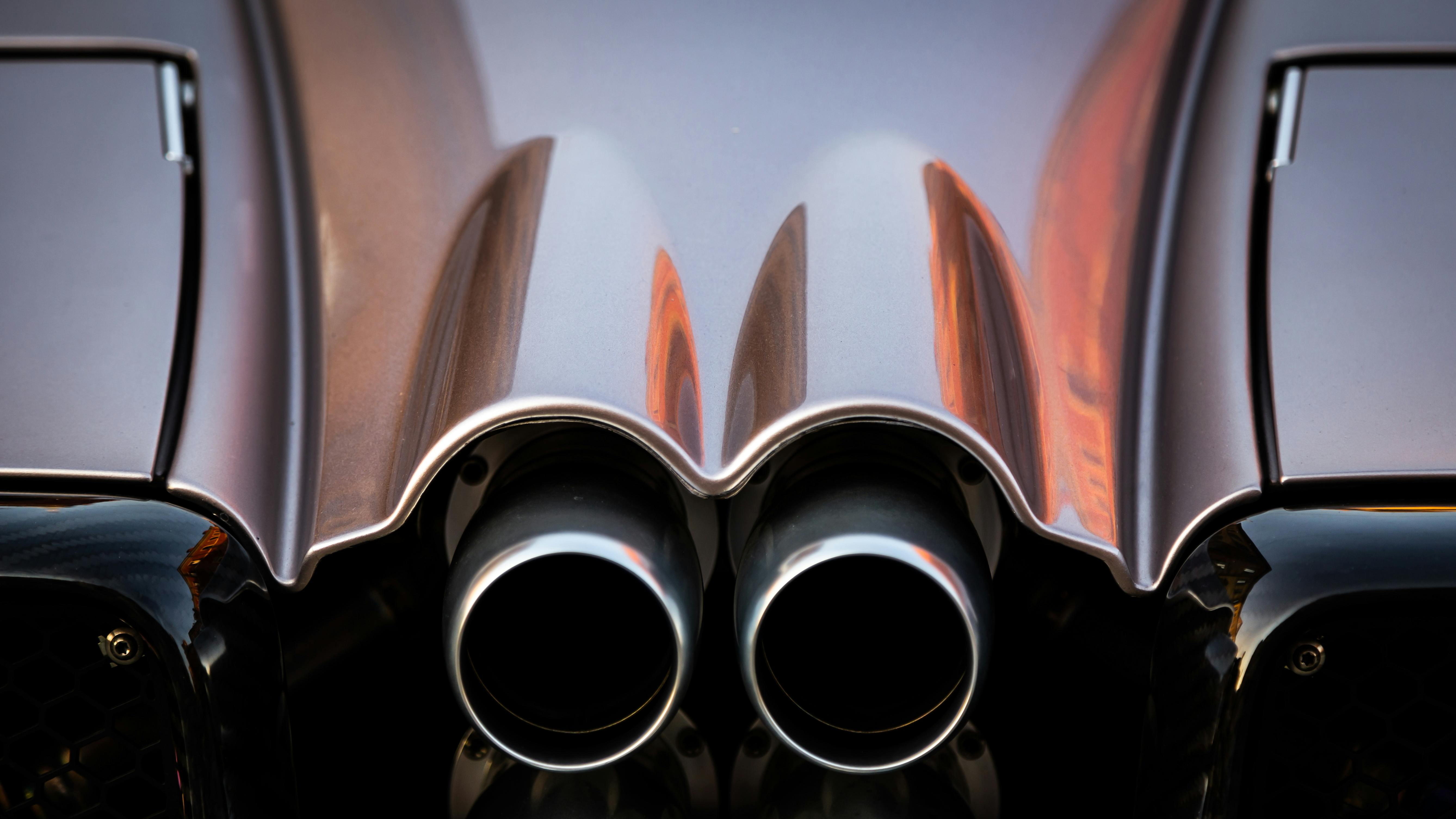Close-up of Luxury Sports Car Exhaust Design · Free Stock Photo