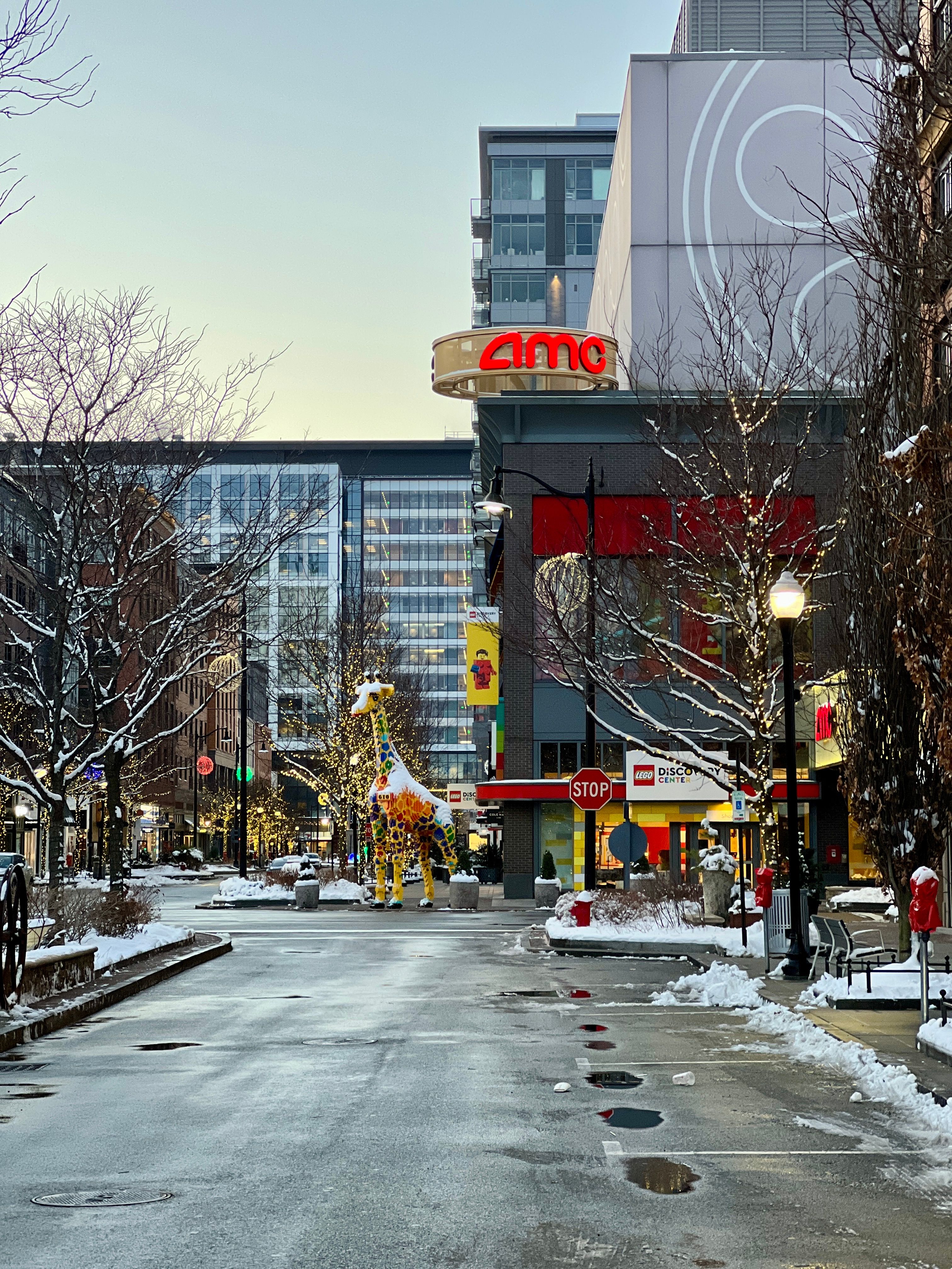 Snowy Urban Street with AMC Theater · Free Stock Photo