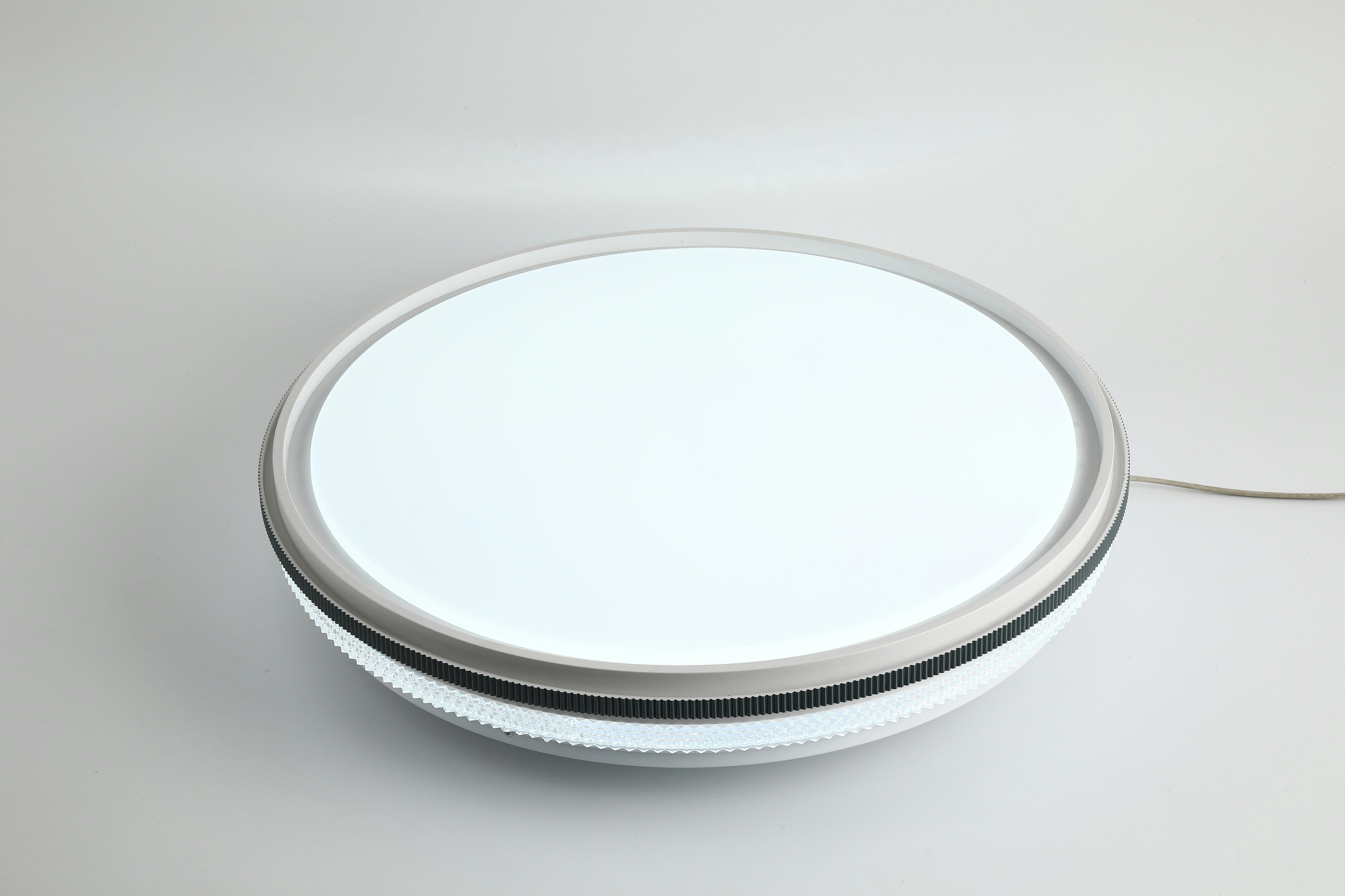 Modern Circular Ceiling Light on White Background · Free Stock Photo