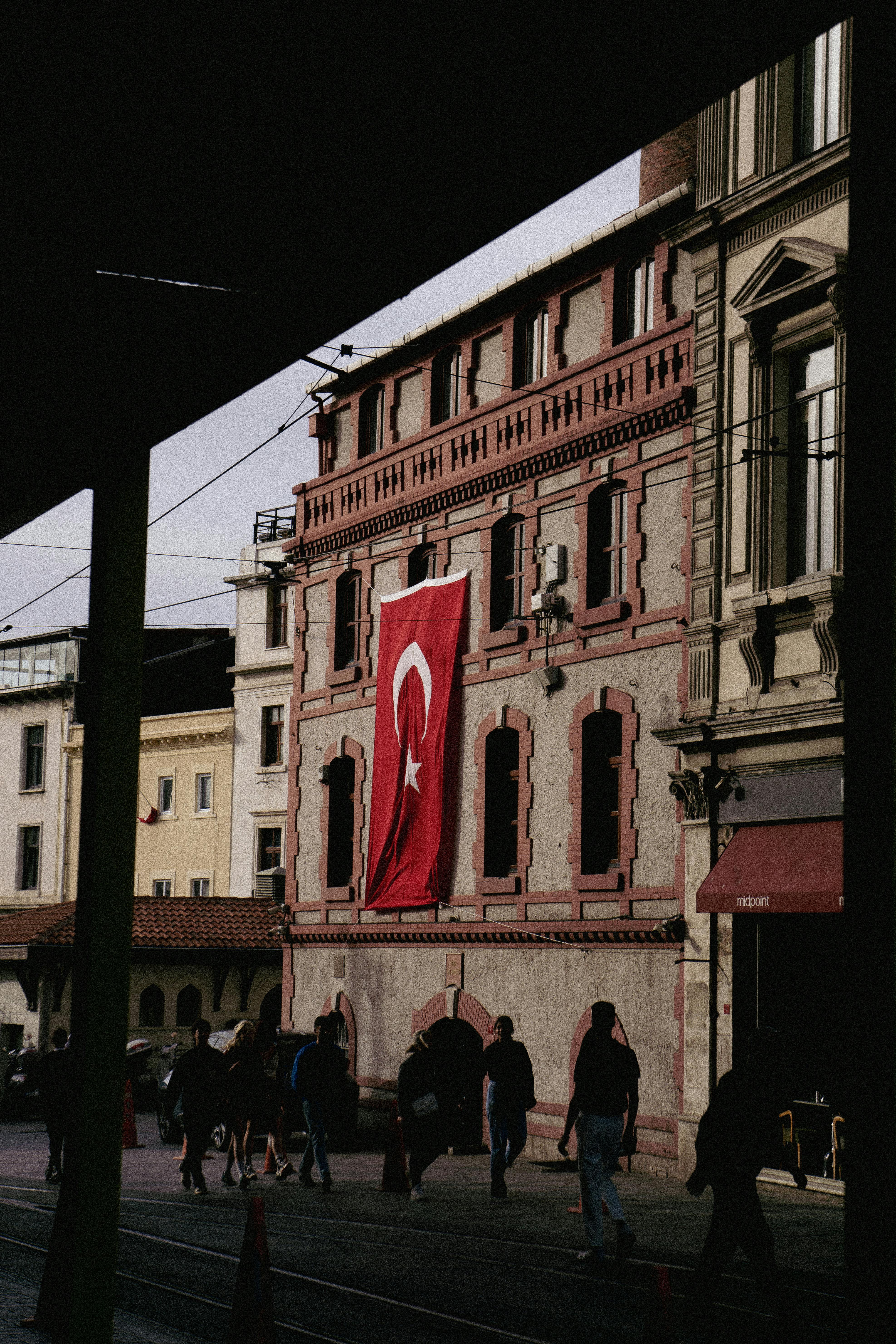 Historic Turkish Building with National Flag · Free Stock Photo