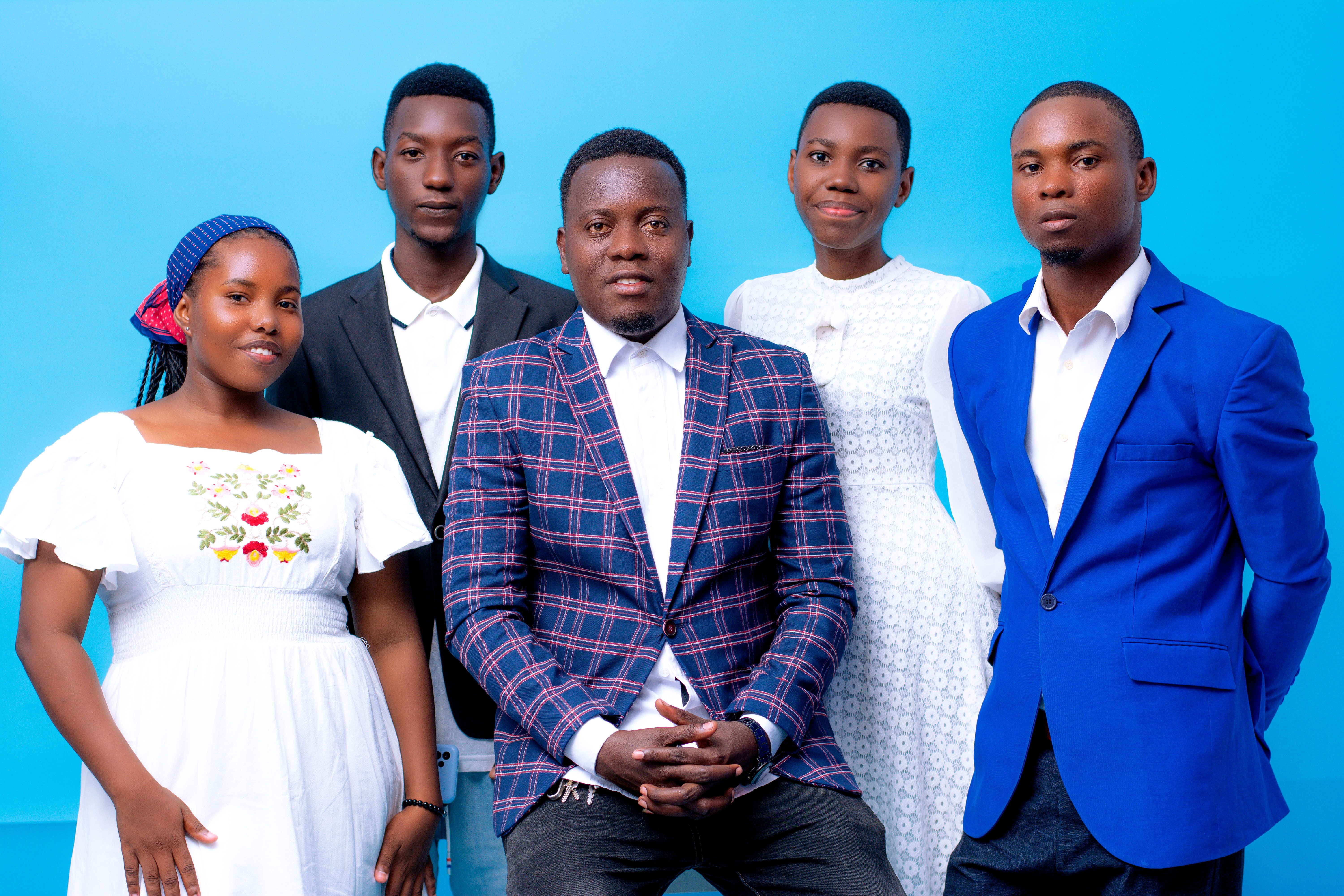 Group of Young Tanzanian Adults in Formal Attire · Free Stock Photo