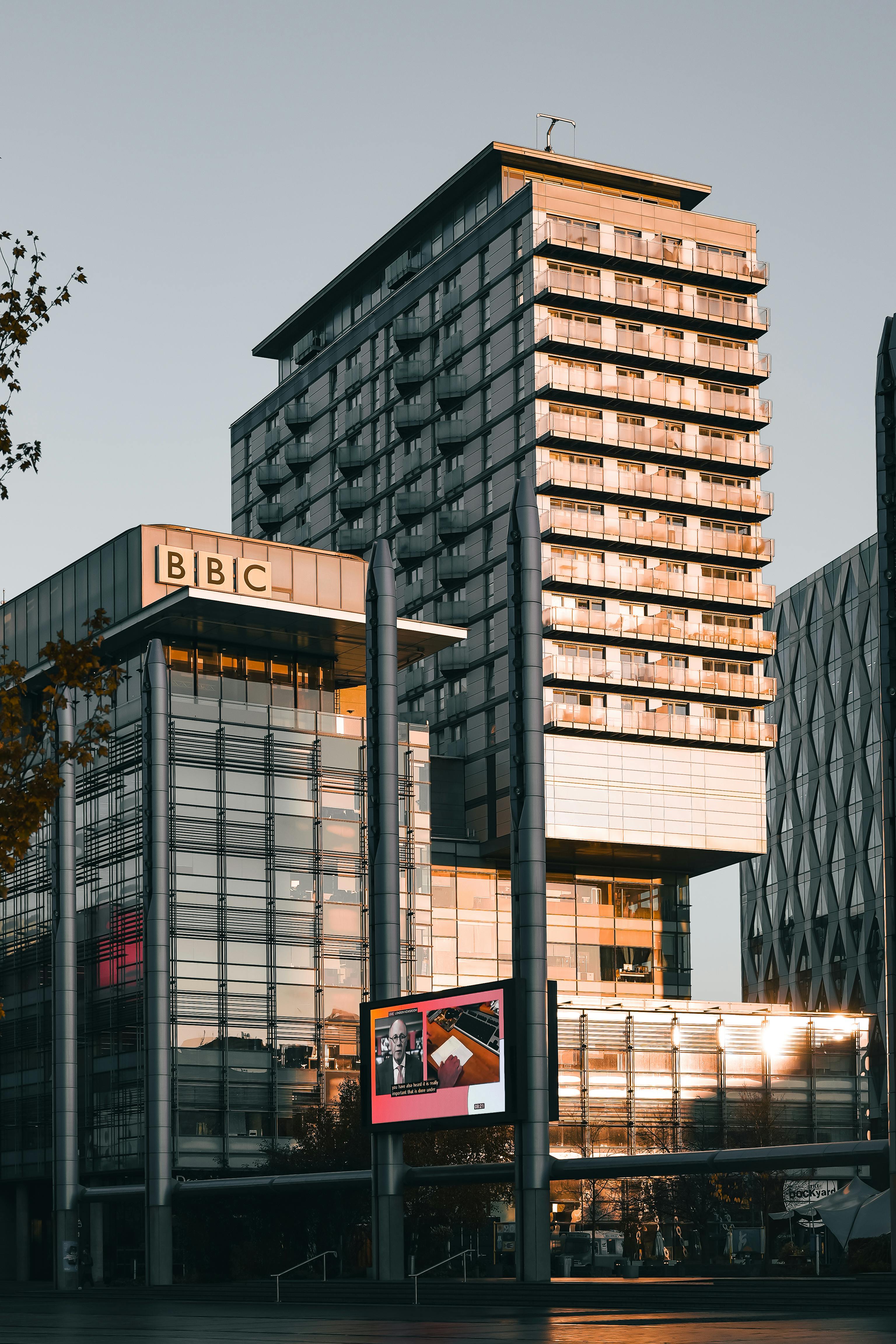 BBC Building at Salford Quays during Golden Hour · Free Stock Photo