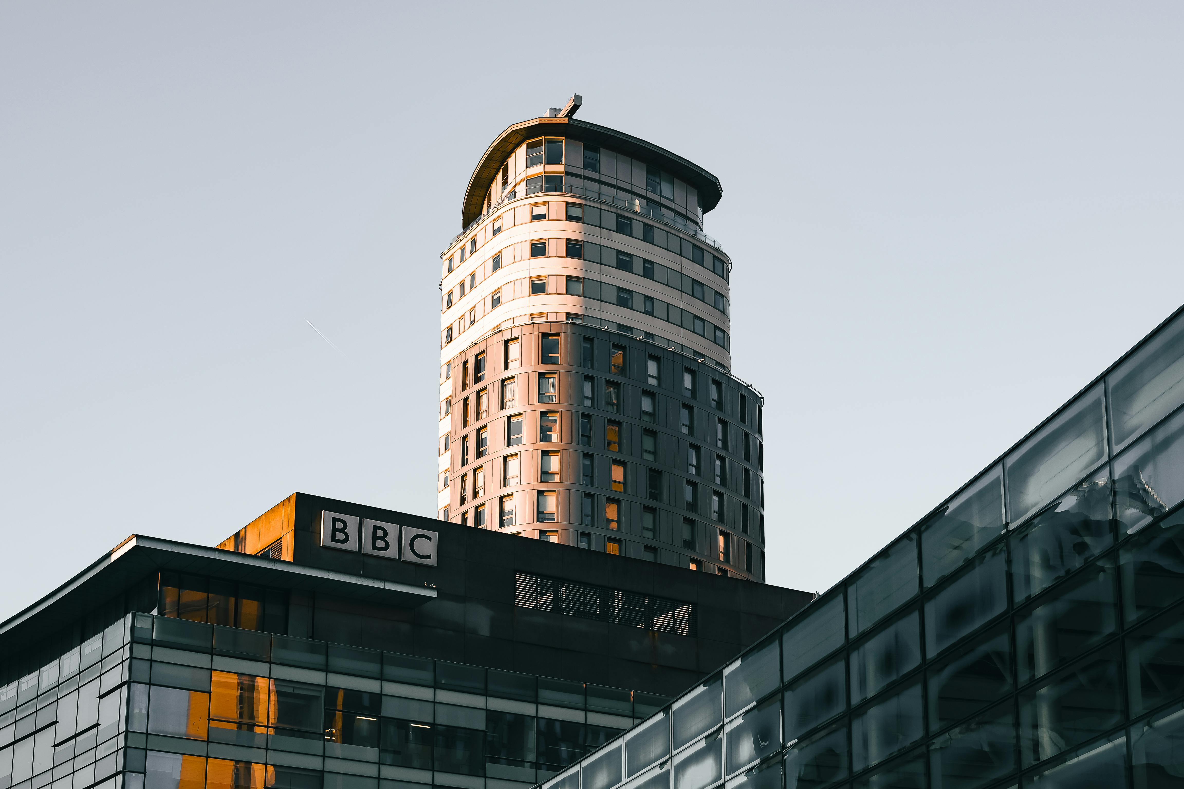 BBC Building at Salford Quays during Golden Hour · Free Stock Photo
