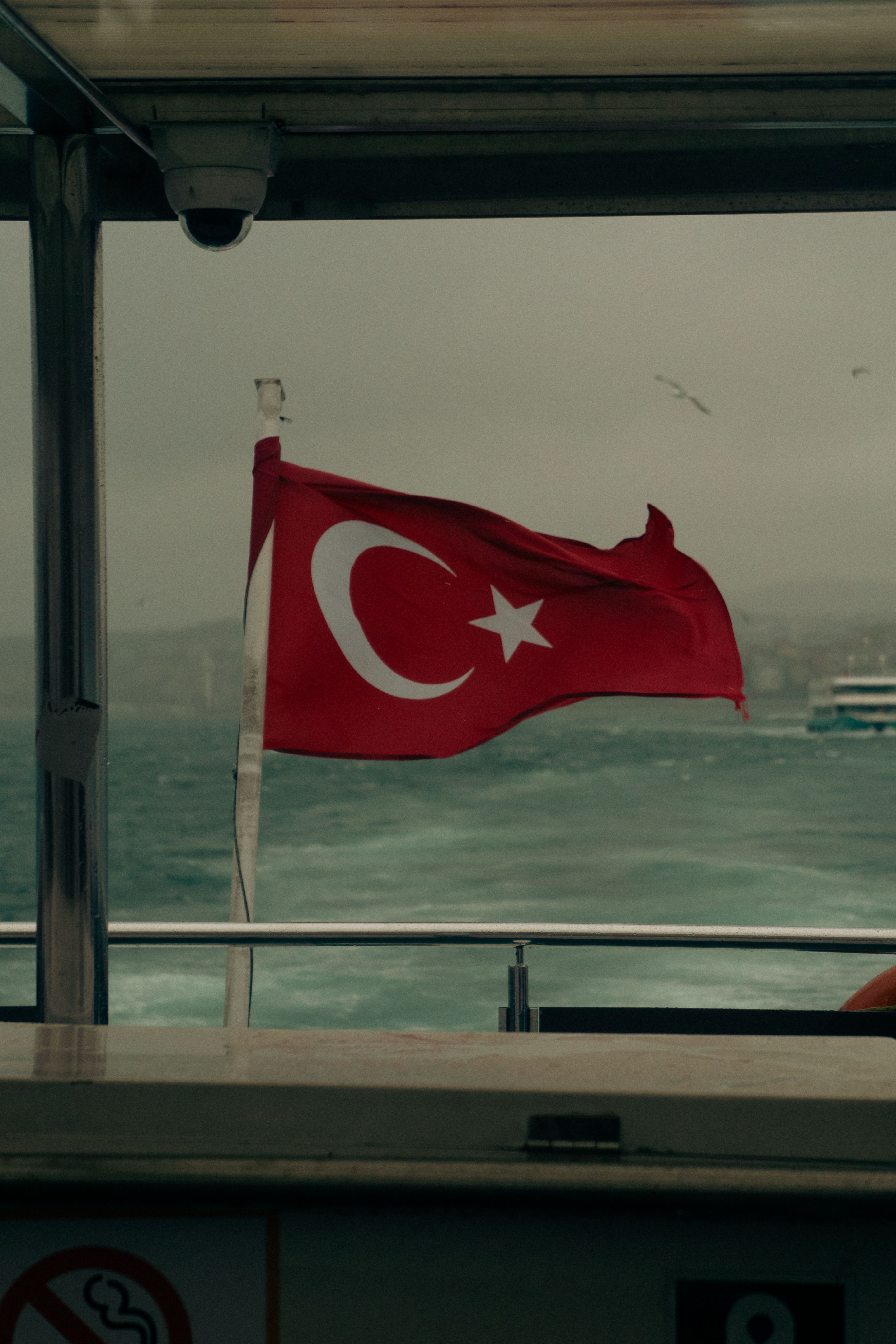 Turkish Flag Waving on a Boat in Istanbul · Free Stock Photo