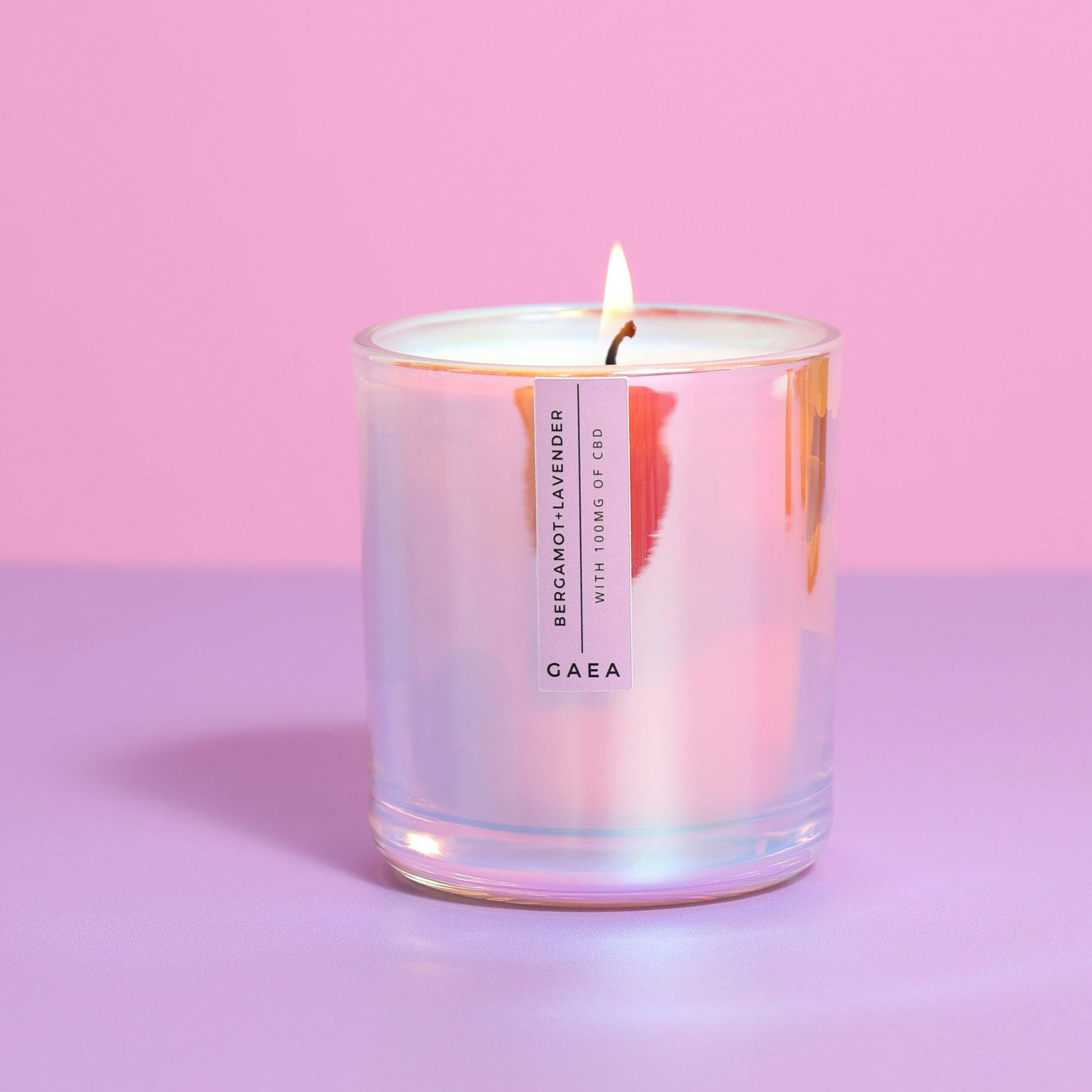 CBD-Infused Luxury Candle with Soft Glow · Free Stock Photo