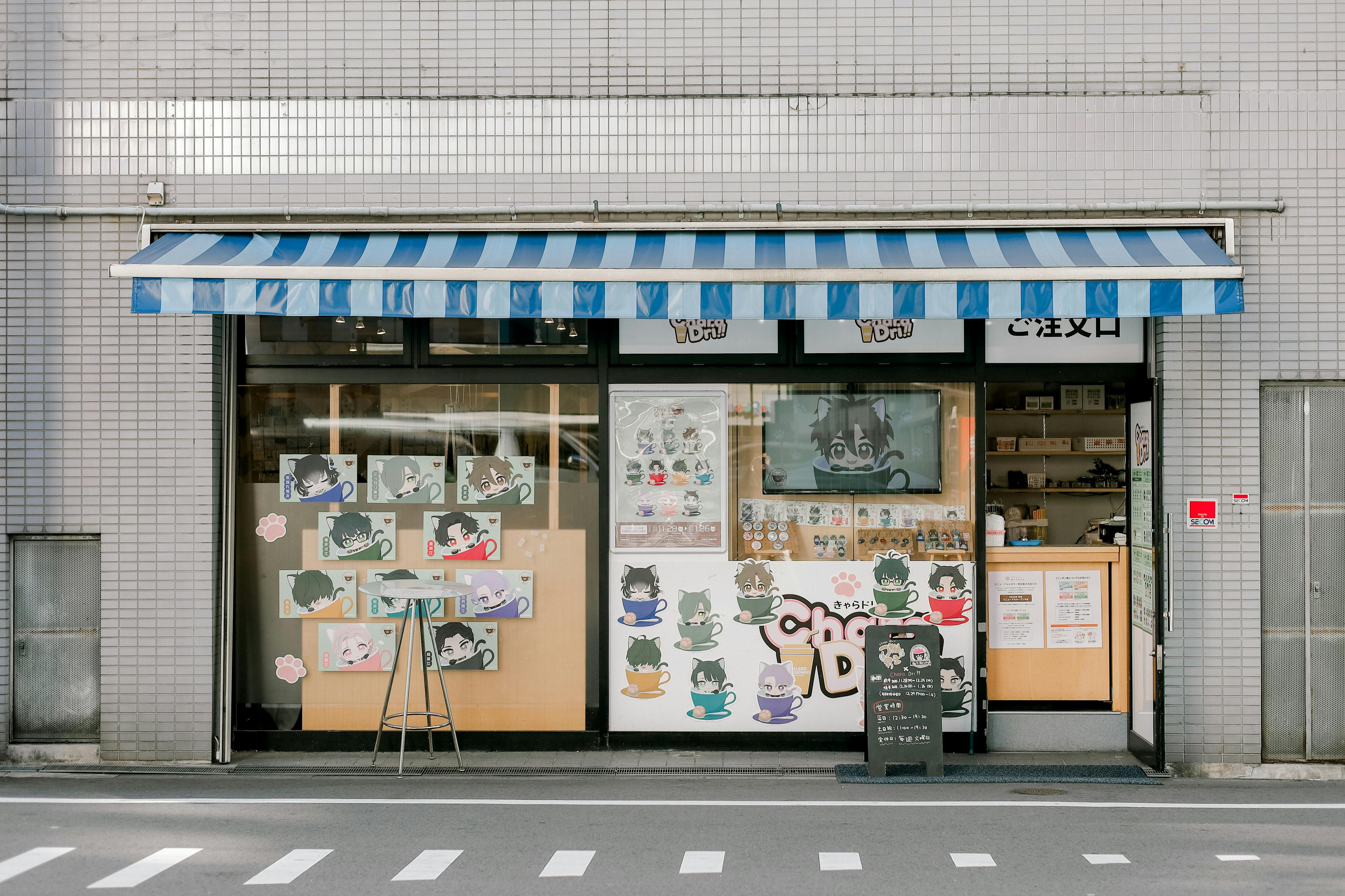 Street view of a whimsical anime-themed storefront · Free Stock Photo