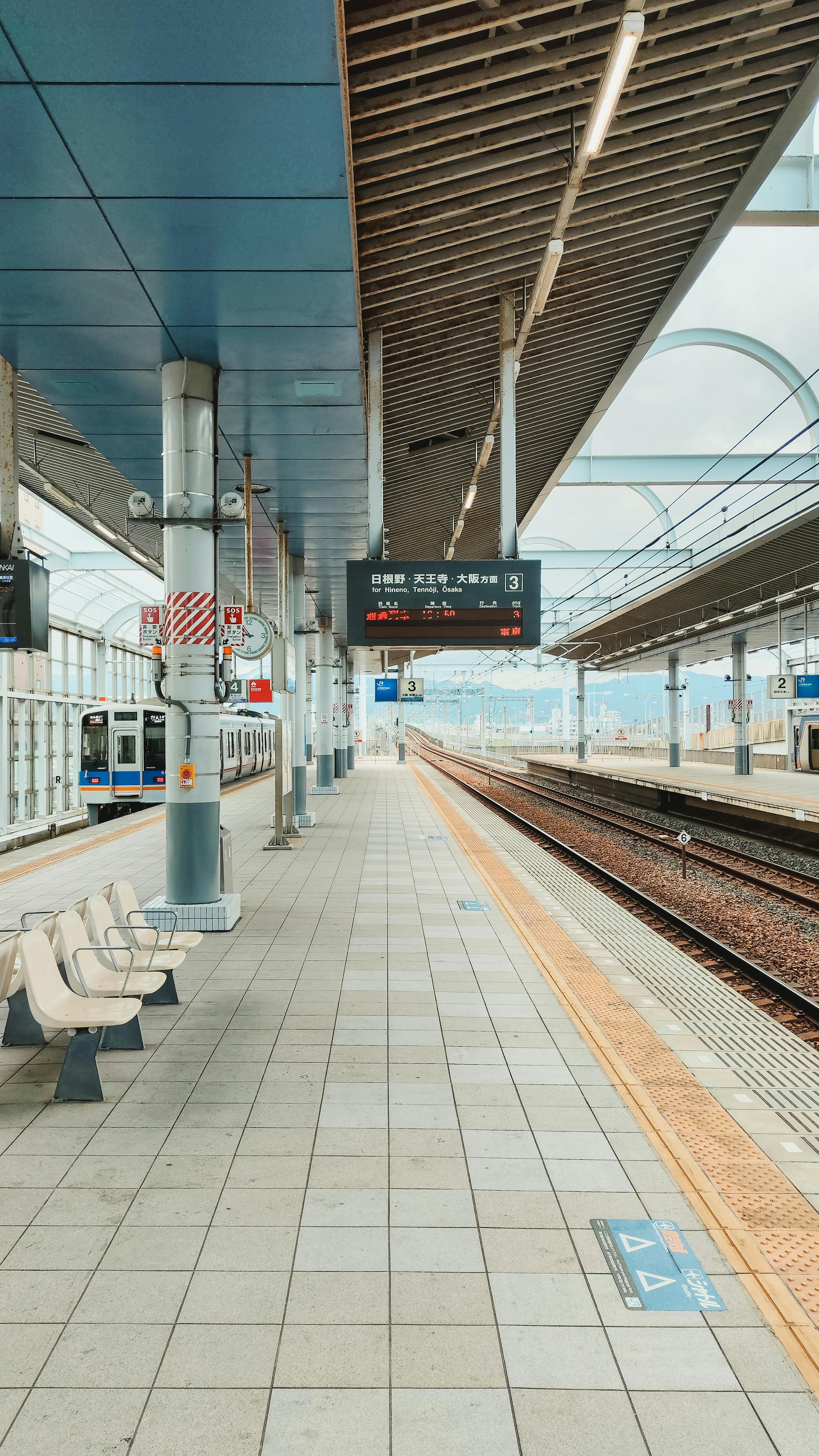 Modern Train Station Platform with Empty Tracks · Free Stock Photo