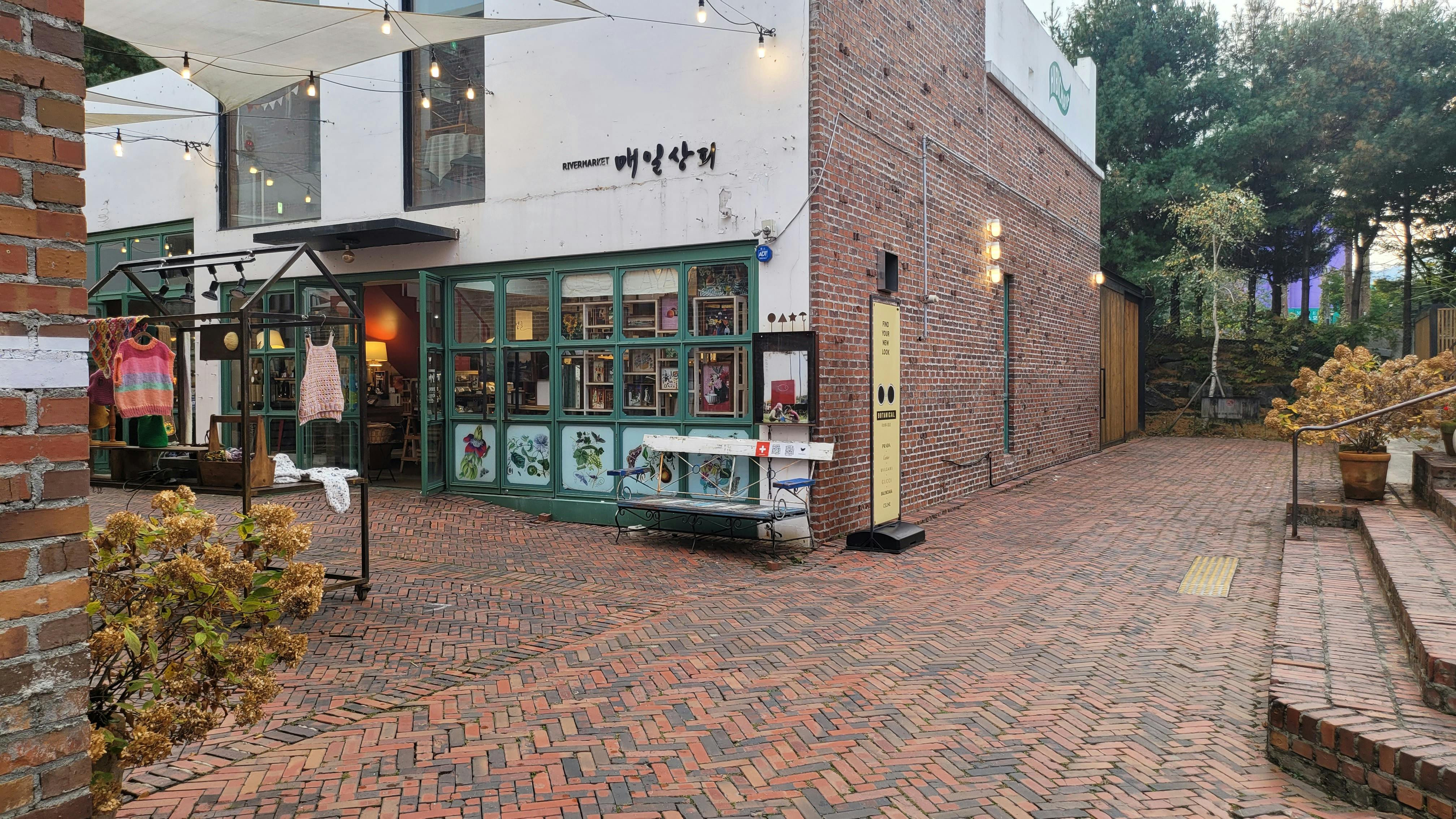 Charming Brick Alley with Vintage Storefront · Free Stock Photo