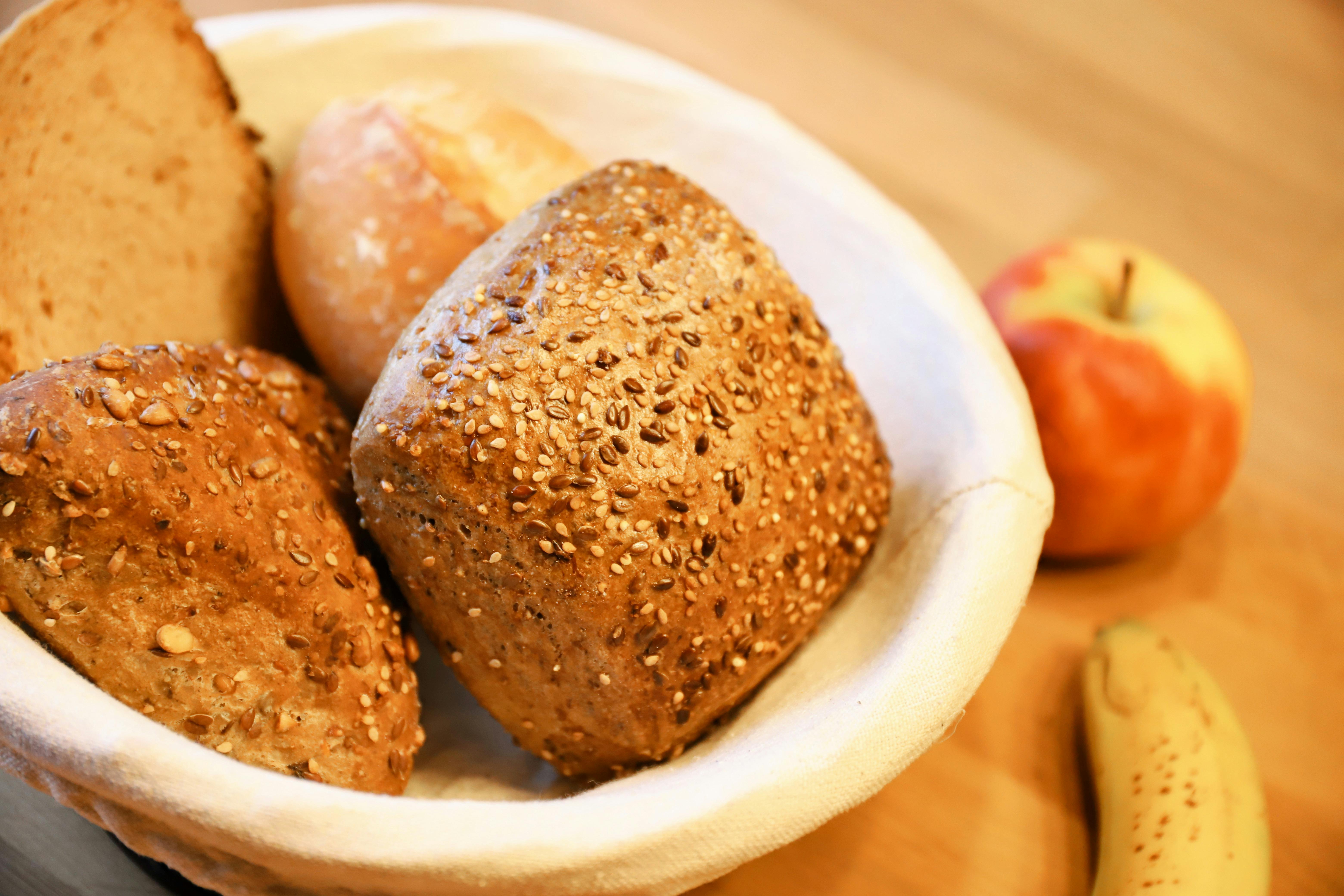 Fresh Multigrain Bread Rolls in a Basket · Free Stock Photo
