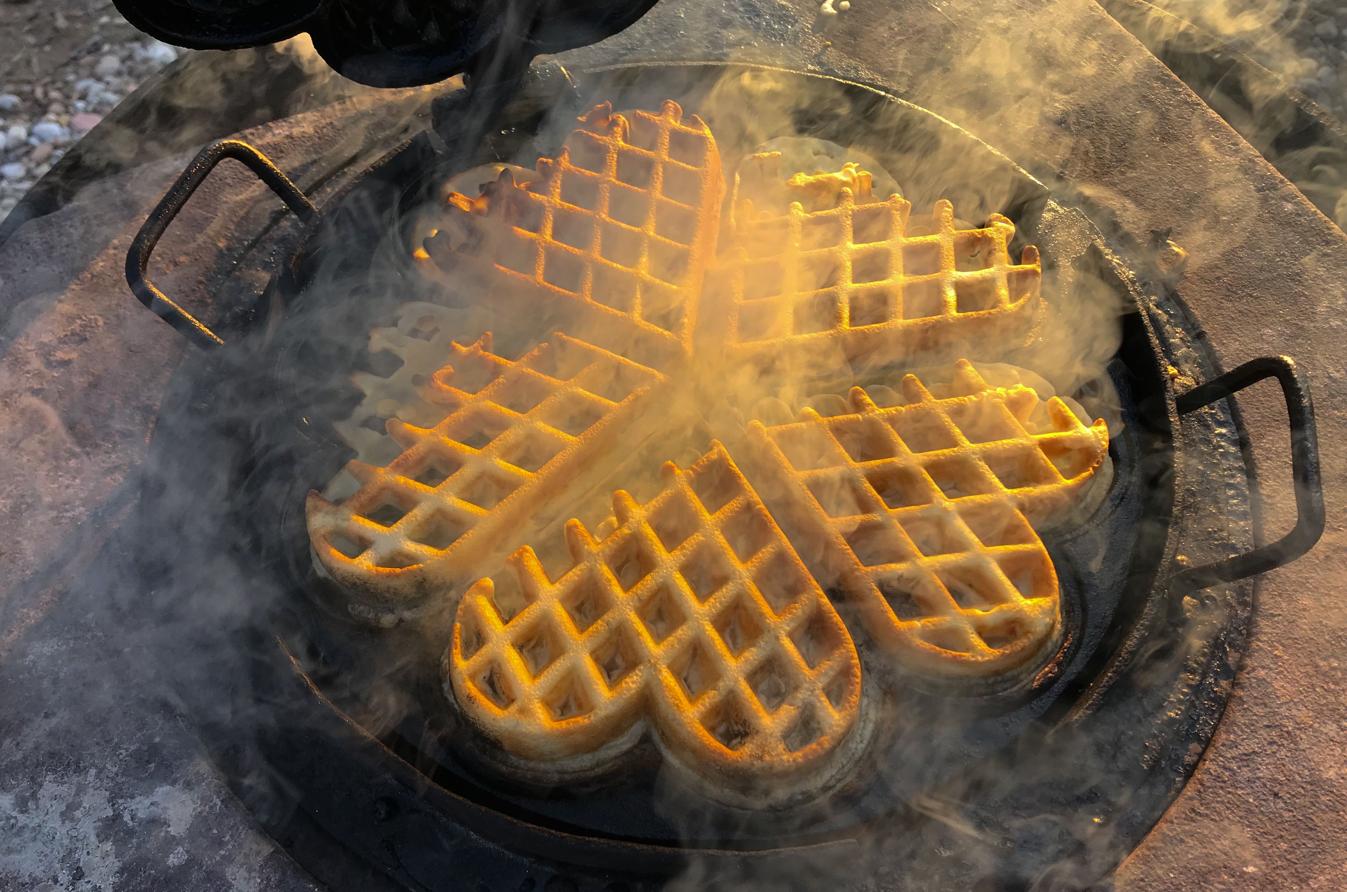 Golden Waffles Cooking in Cast Iron Pan · Free Stock Photo