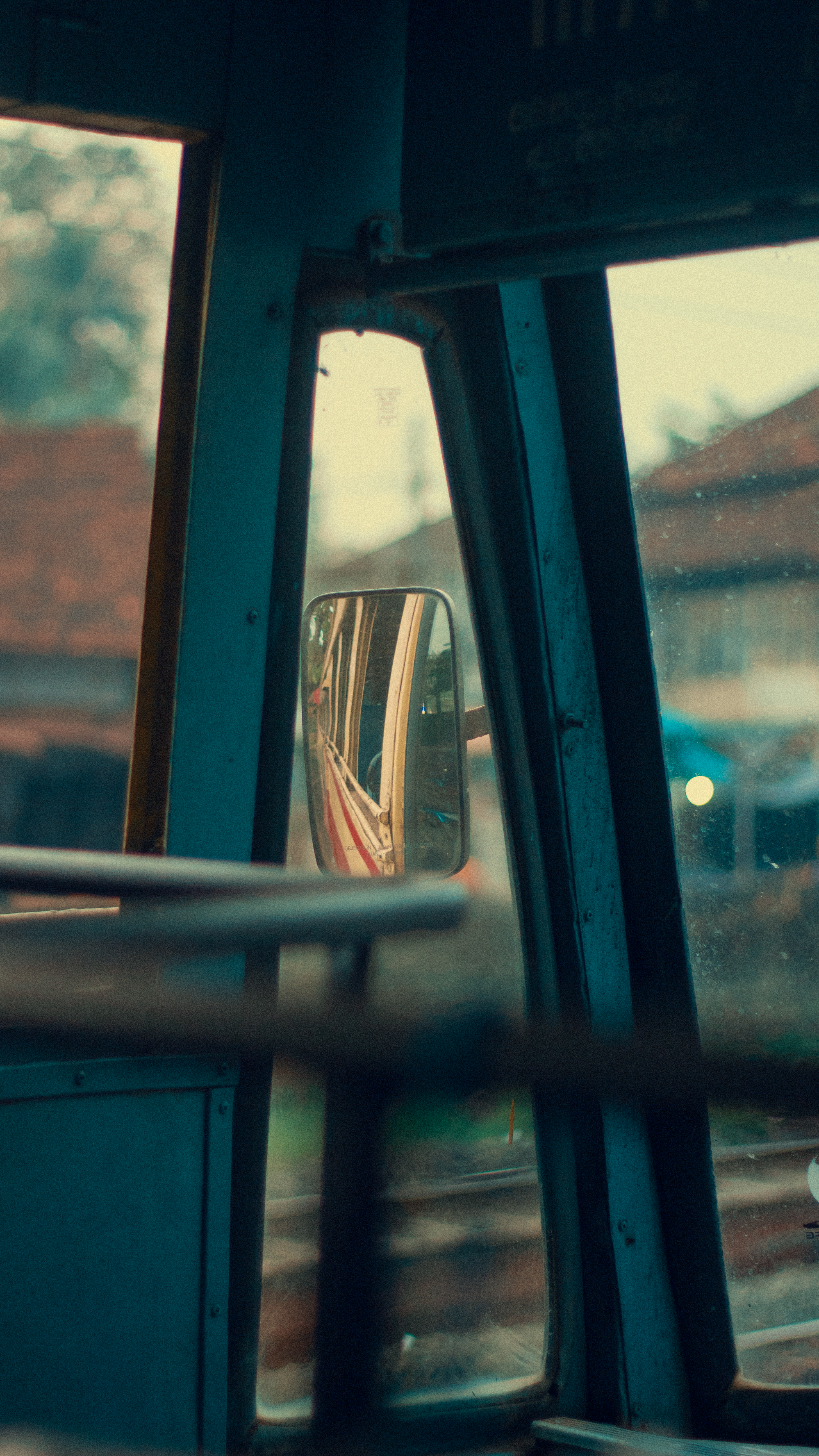 Vintage Bus Interior with Reflective Mirror View · Free Stock Photo