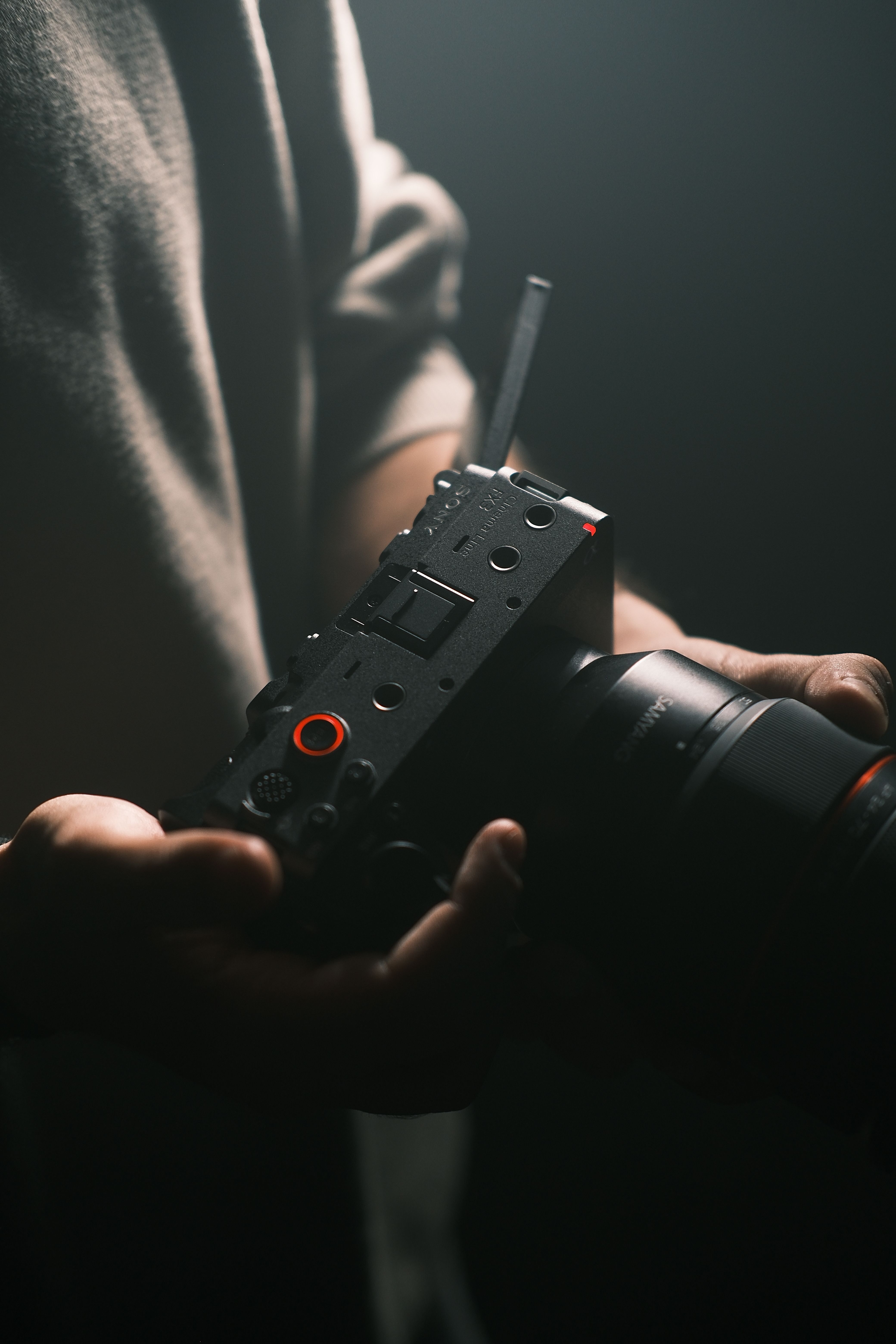 Close-Up of Professional Camera in Hands · Free Stock Photo