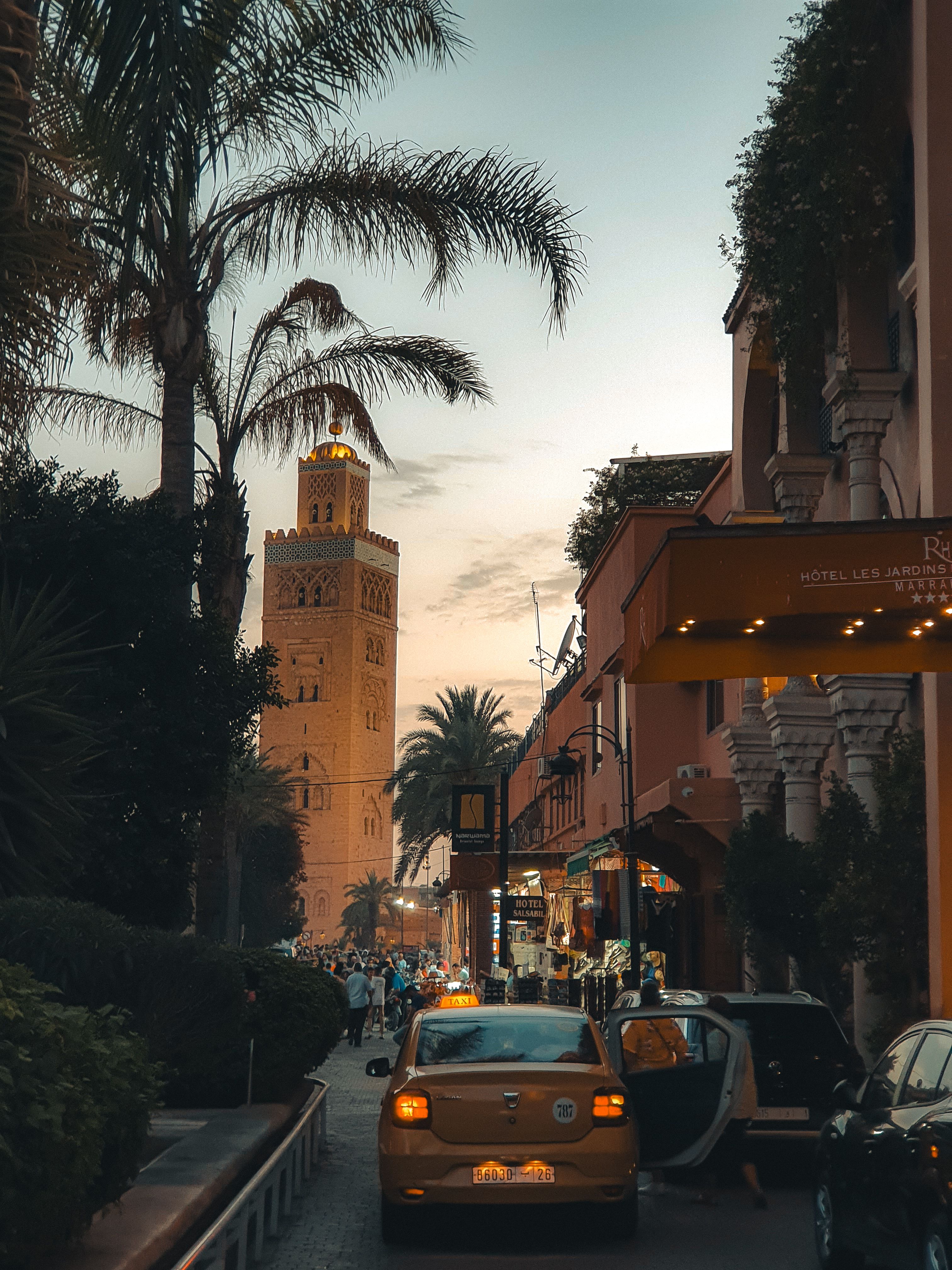 Bustling Street Scene in Marrakech at Sunset · Free Stock Photo